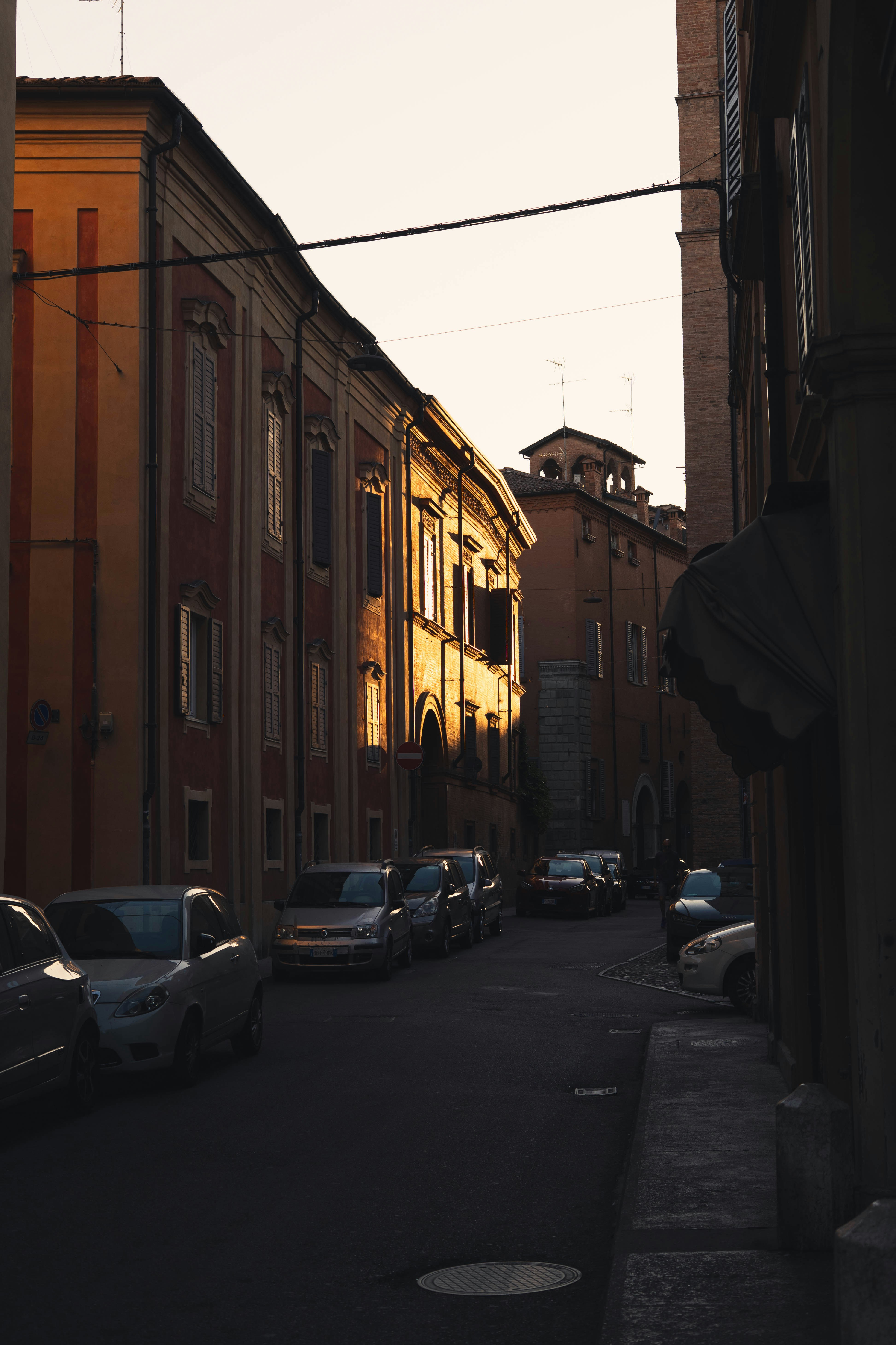 Sunlit Facades Along a Narrow Street