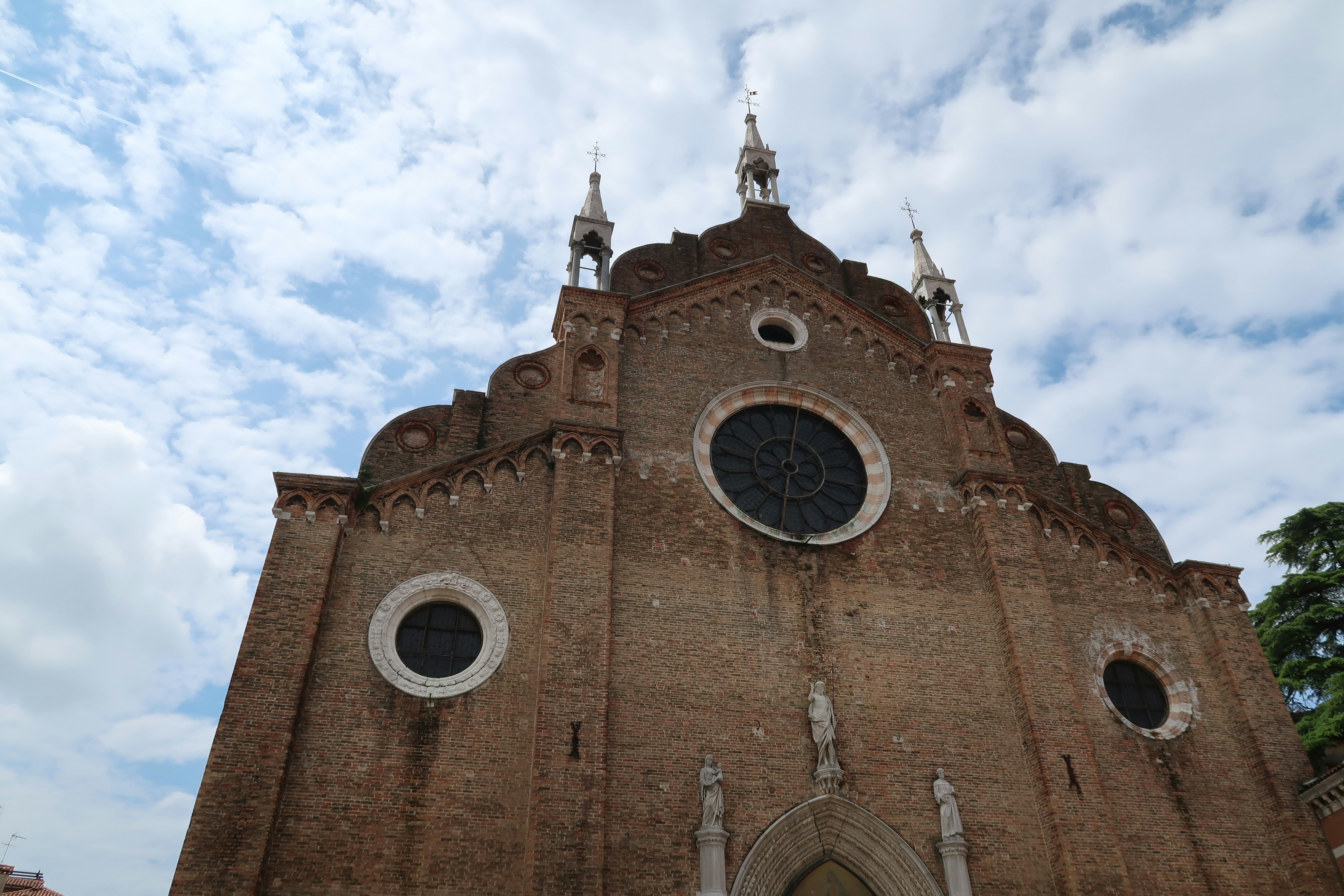 Brick Cathedral Facade Under Open Sky