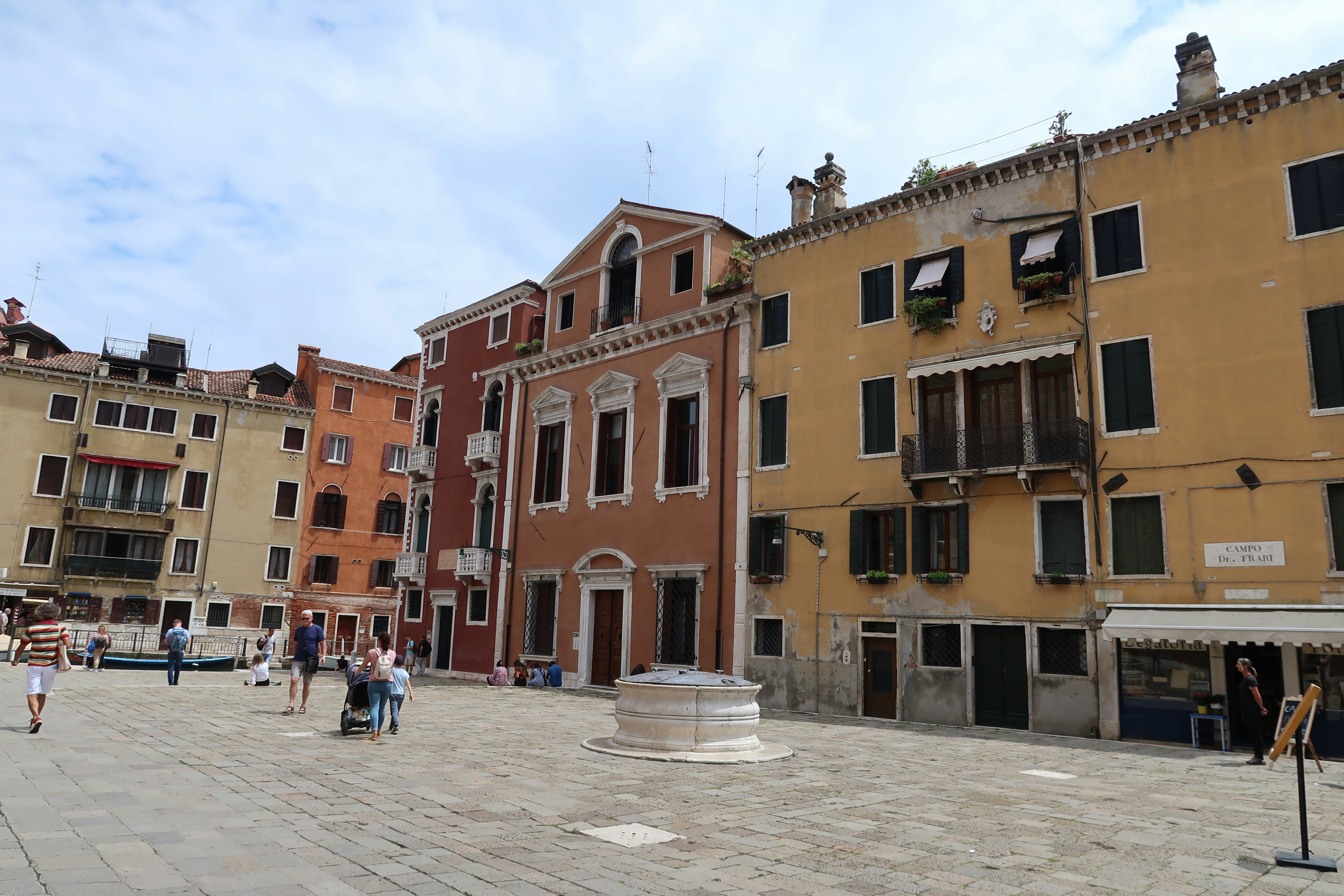 Pastel Facades of a Sunlit Piazza