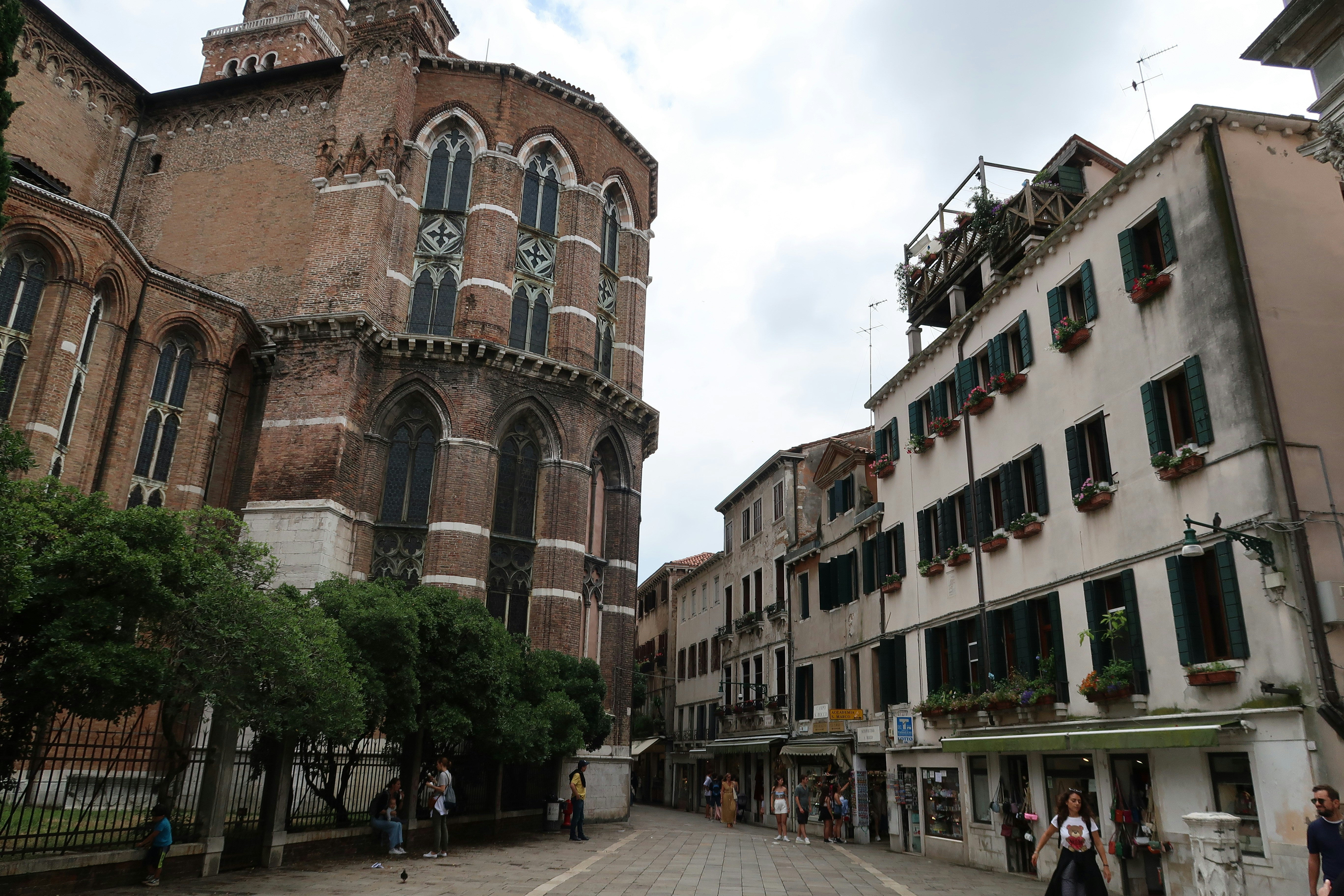 Clocktower Cathedral and Sunlit Calle Dell’Anima