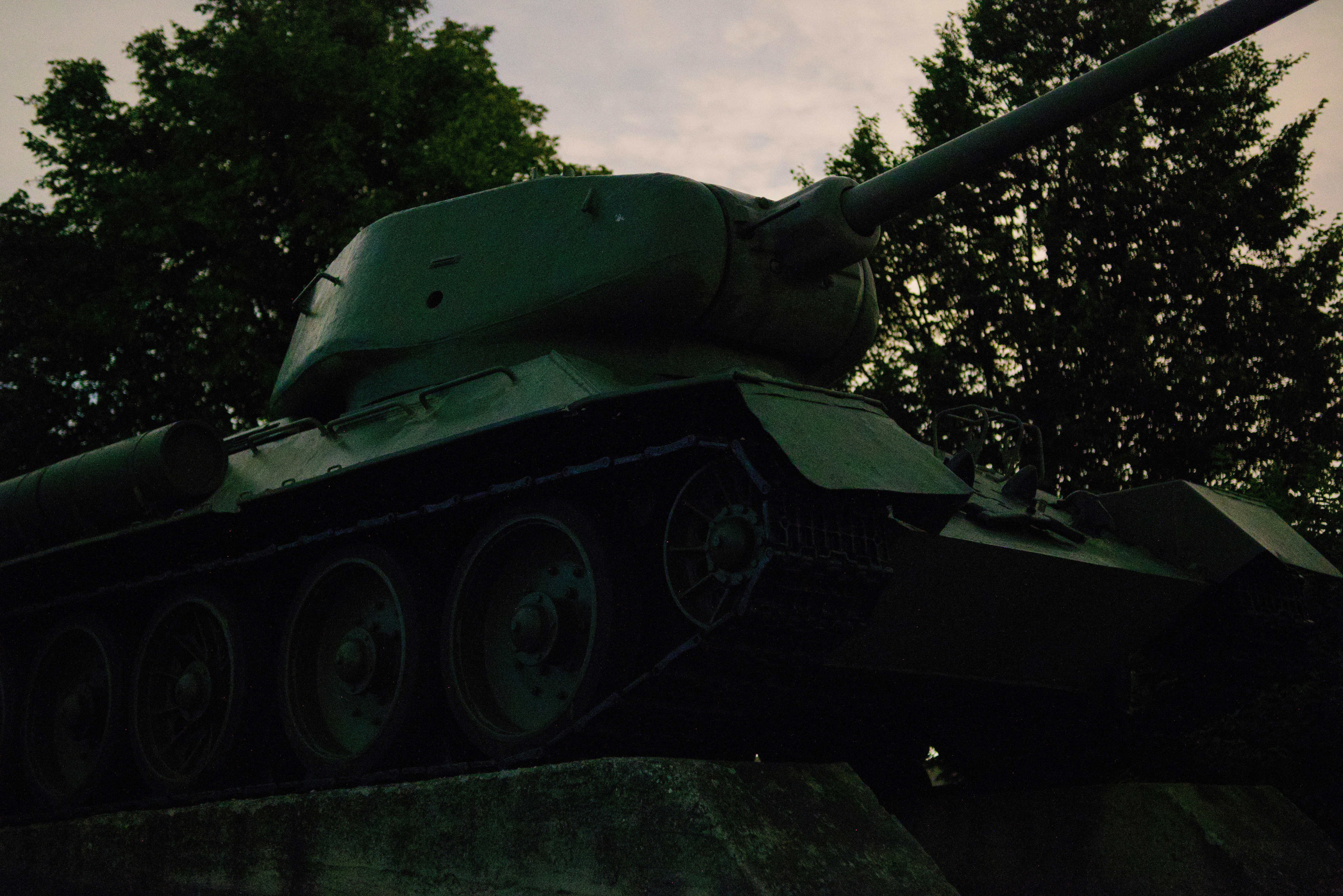 Silhouette of a Warsteel: A Tank Reaching into Twilight