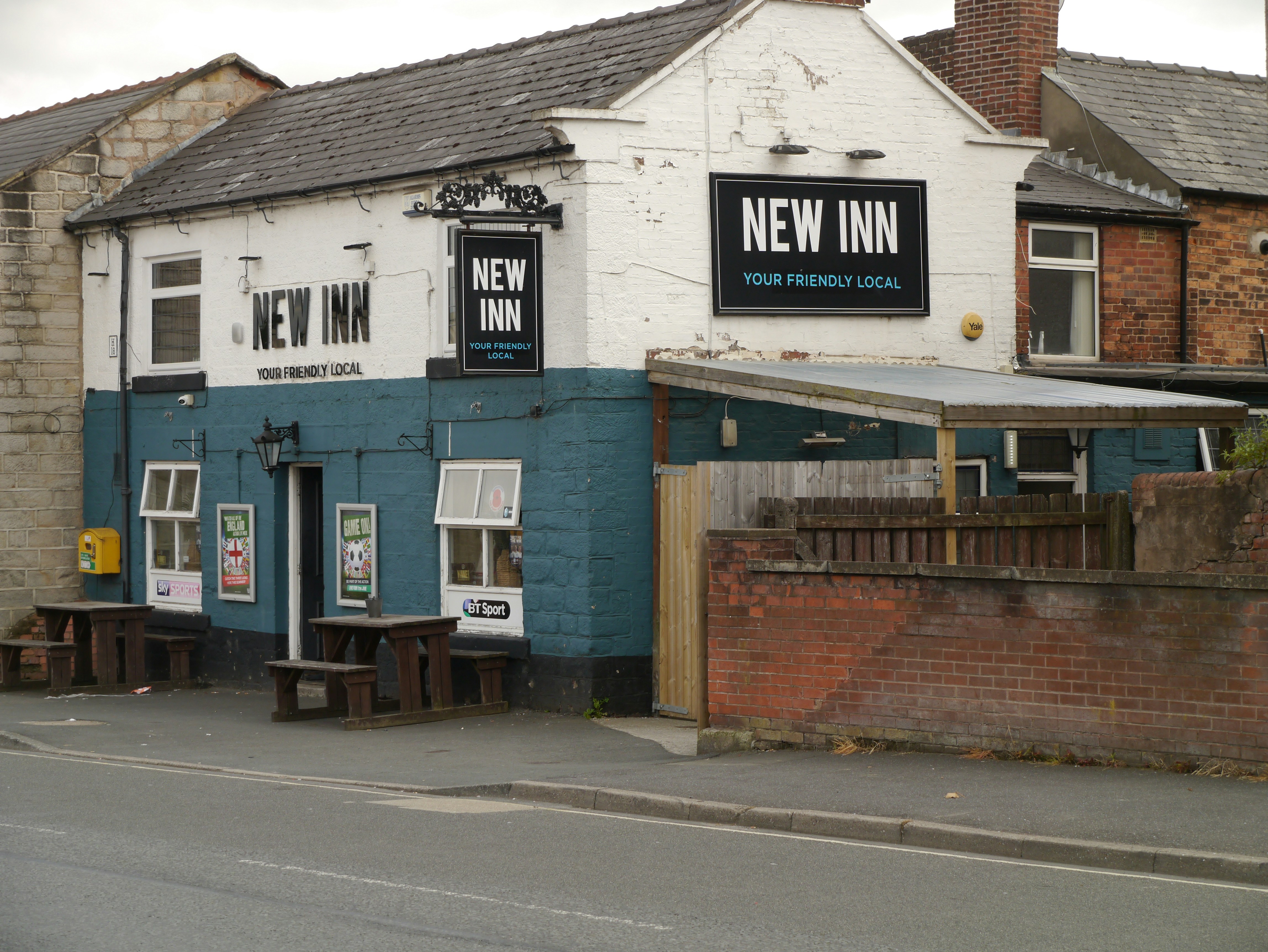 New Inn — A Weathered Local Haven Fronting the Street
