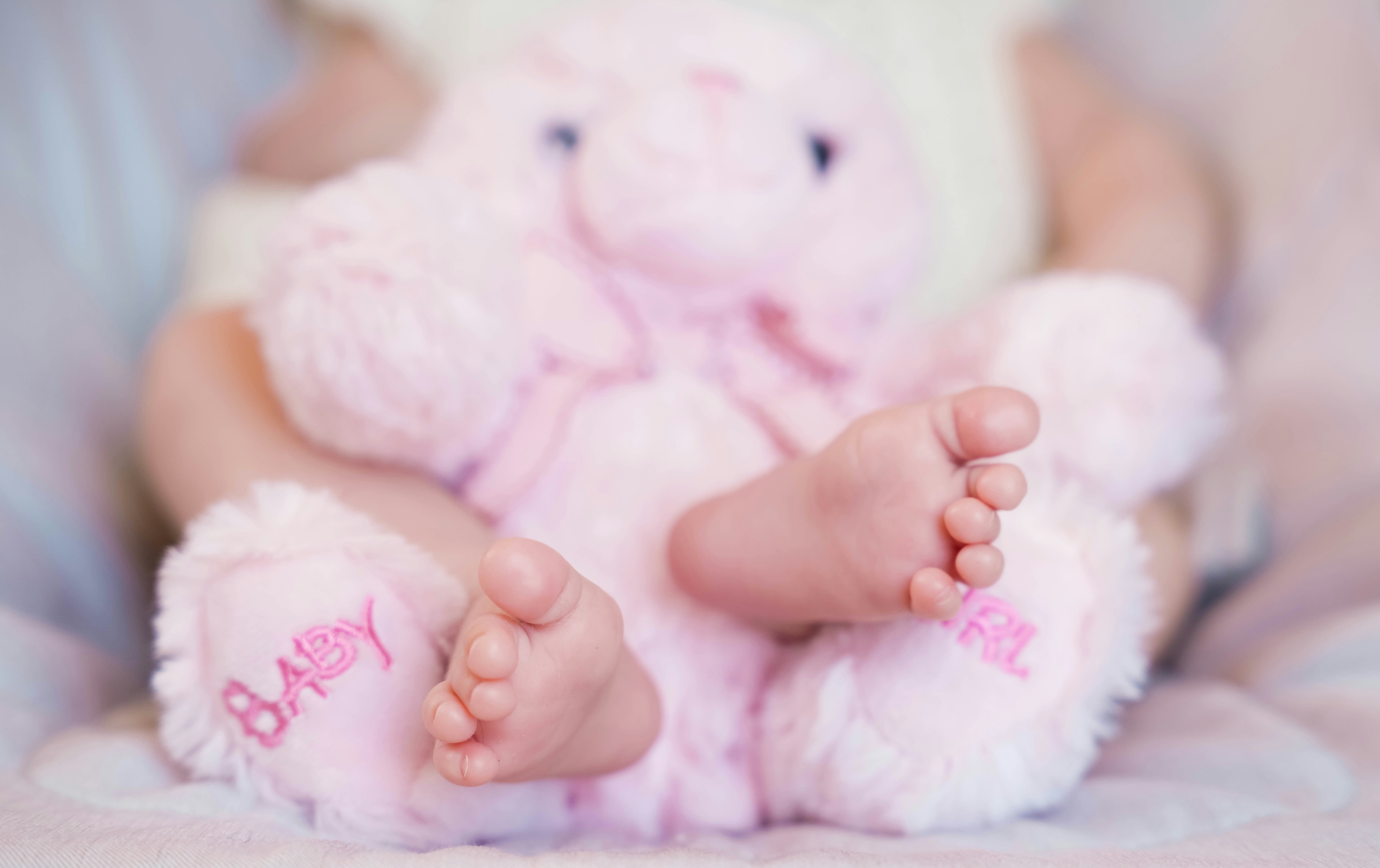 Soft Steps: A Baby’s Pink Plush Pause