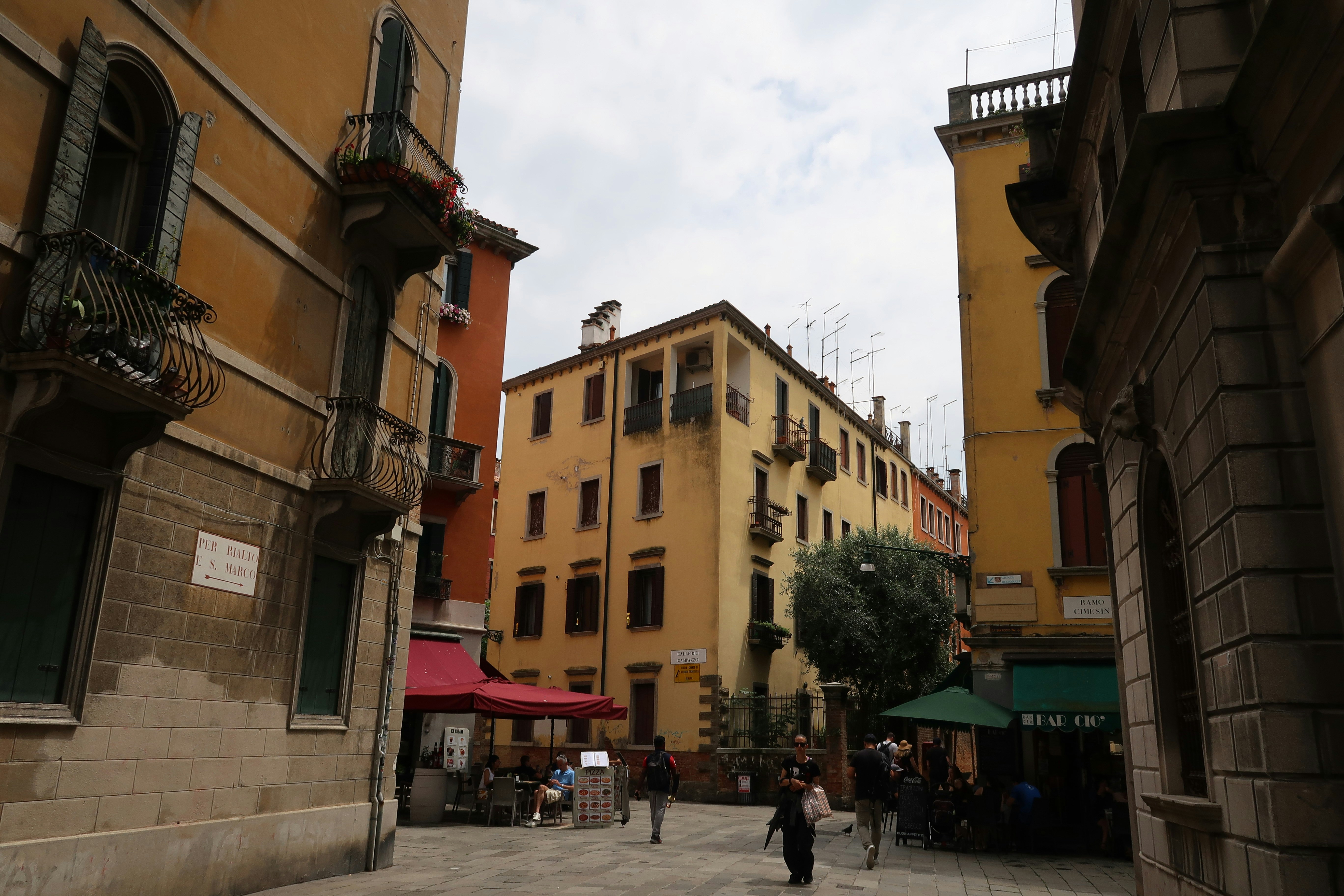 Sunlit Calle of Warm Facades