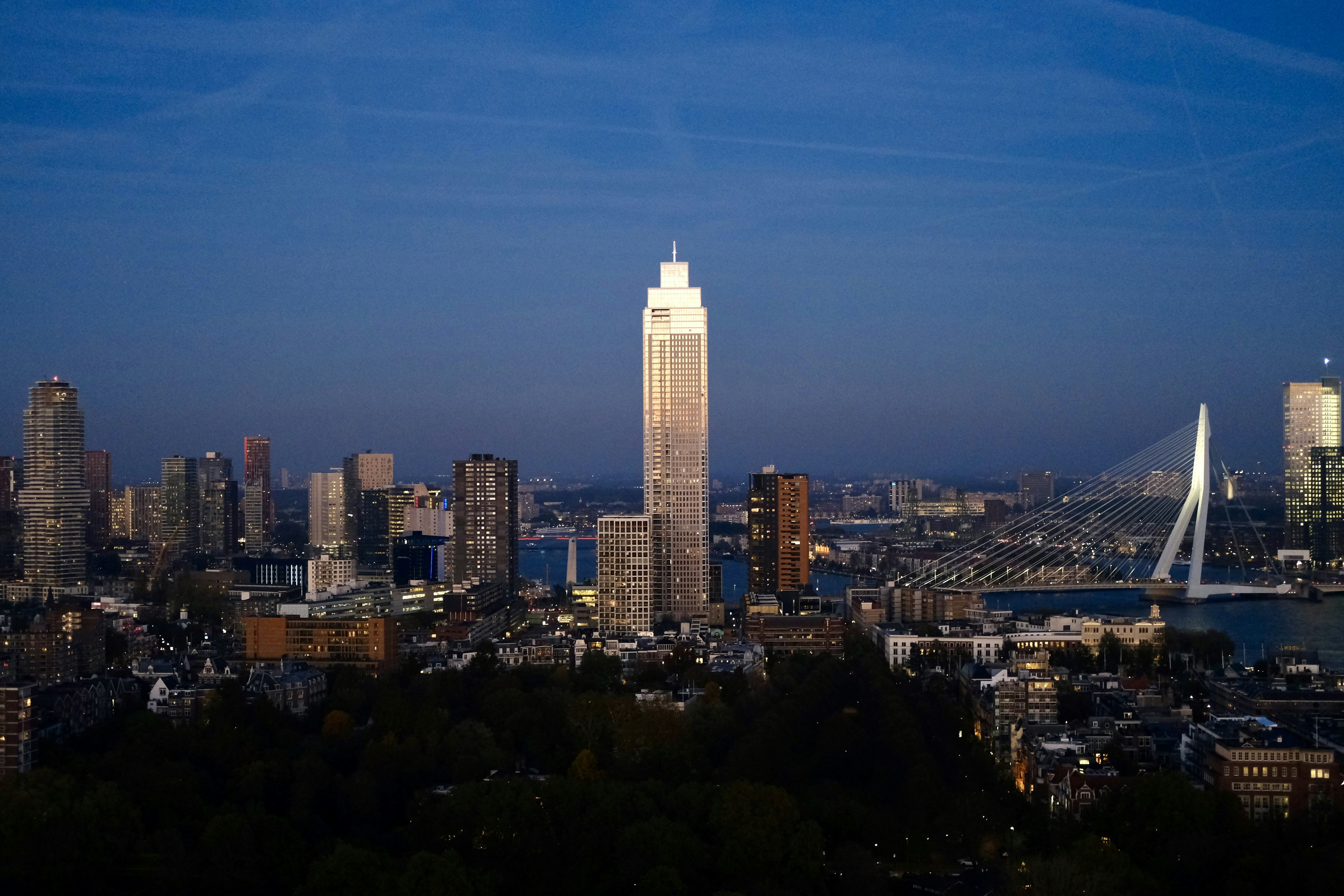 Towering Core: City Skyline with a Bright Central Needle