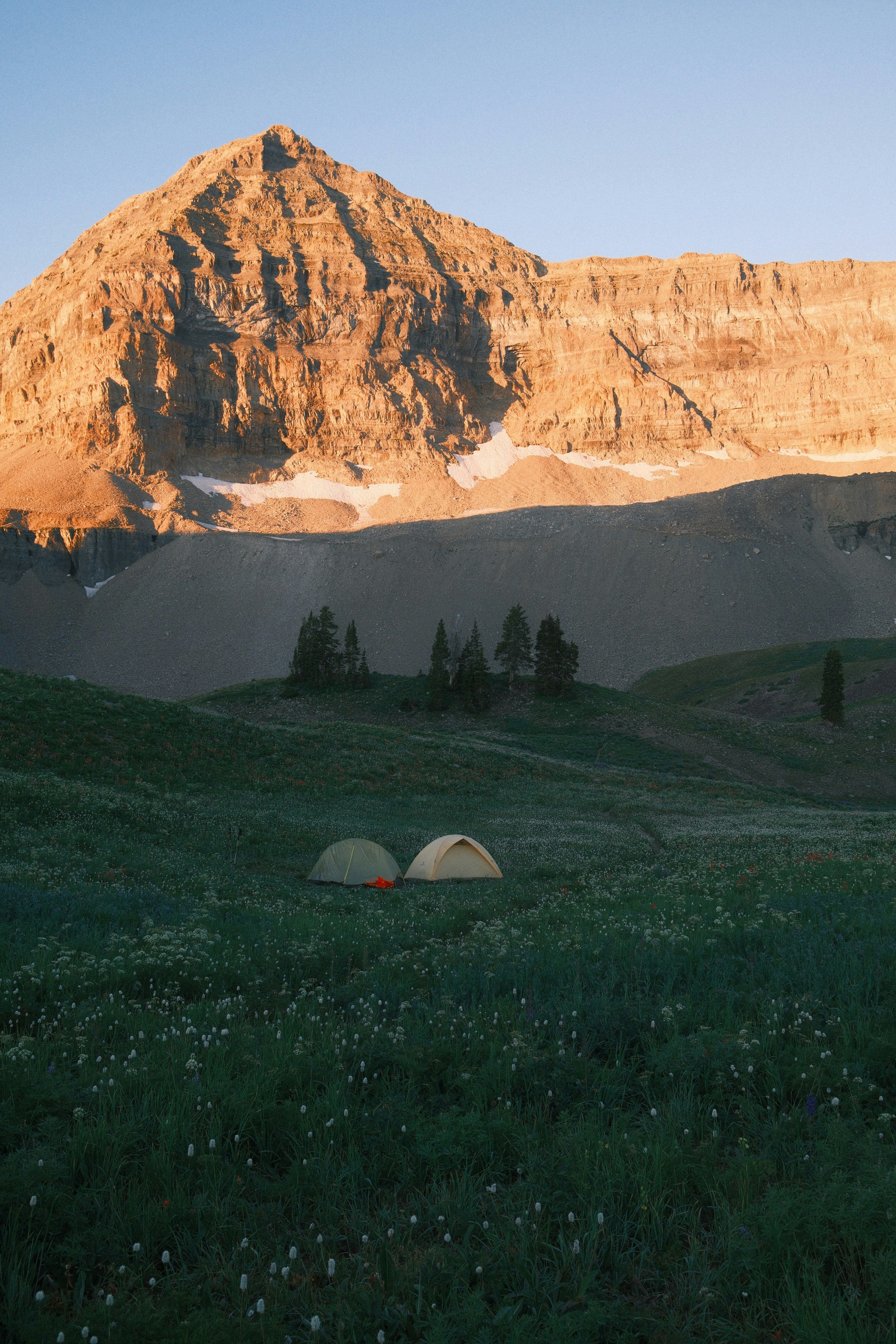 Twin Camps at the Shadow of a Crimson Peak