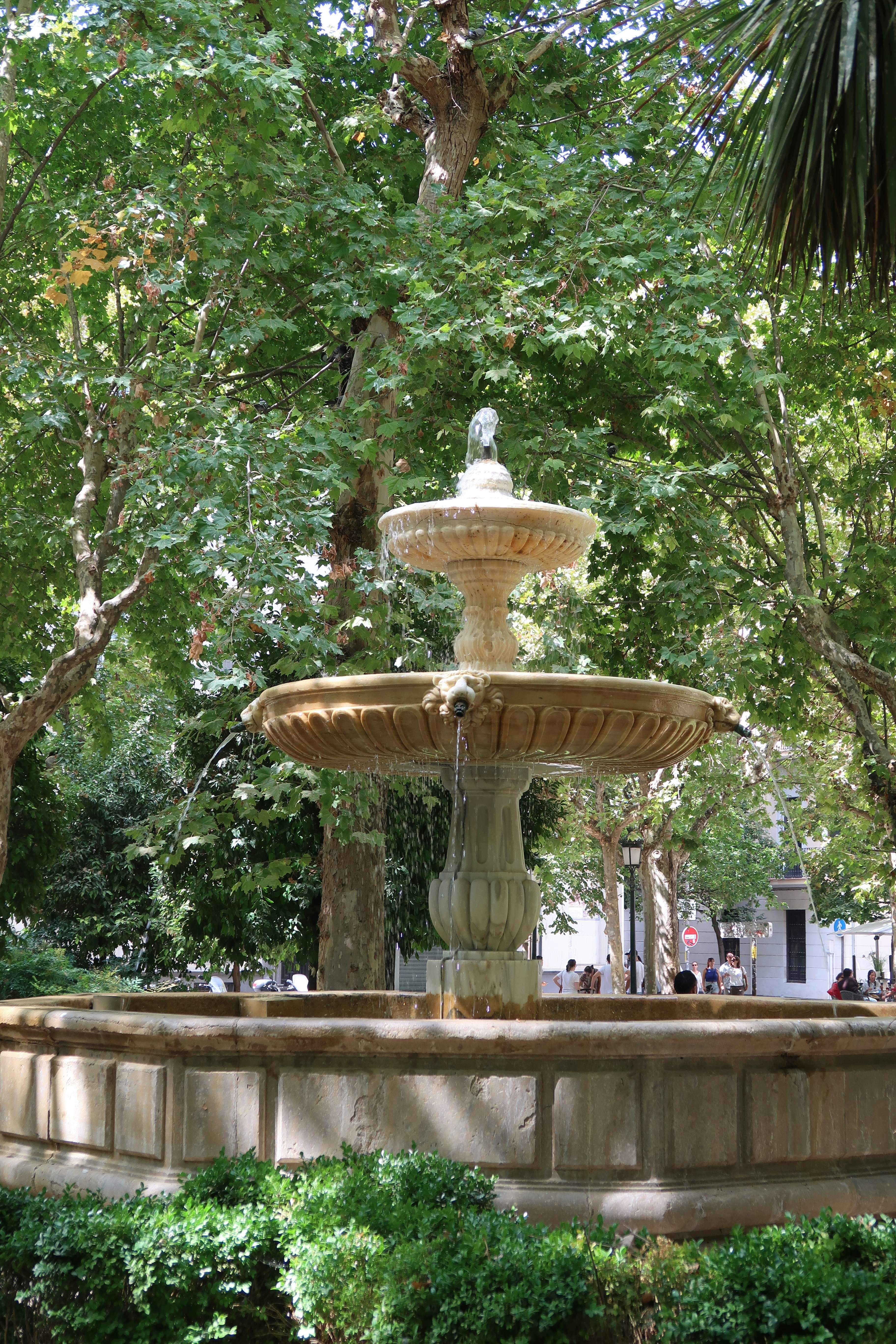 In the Shade of a City Fountain: Tranquil Gardens and Cascading Water