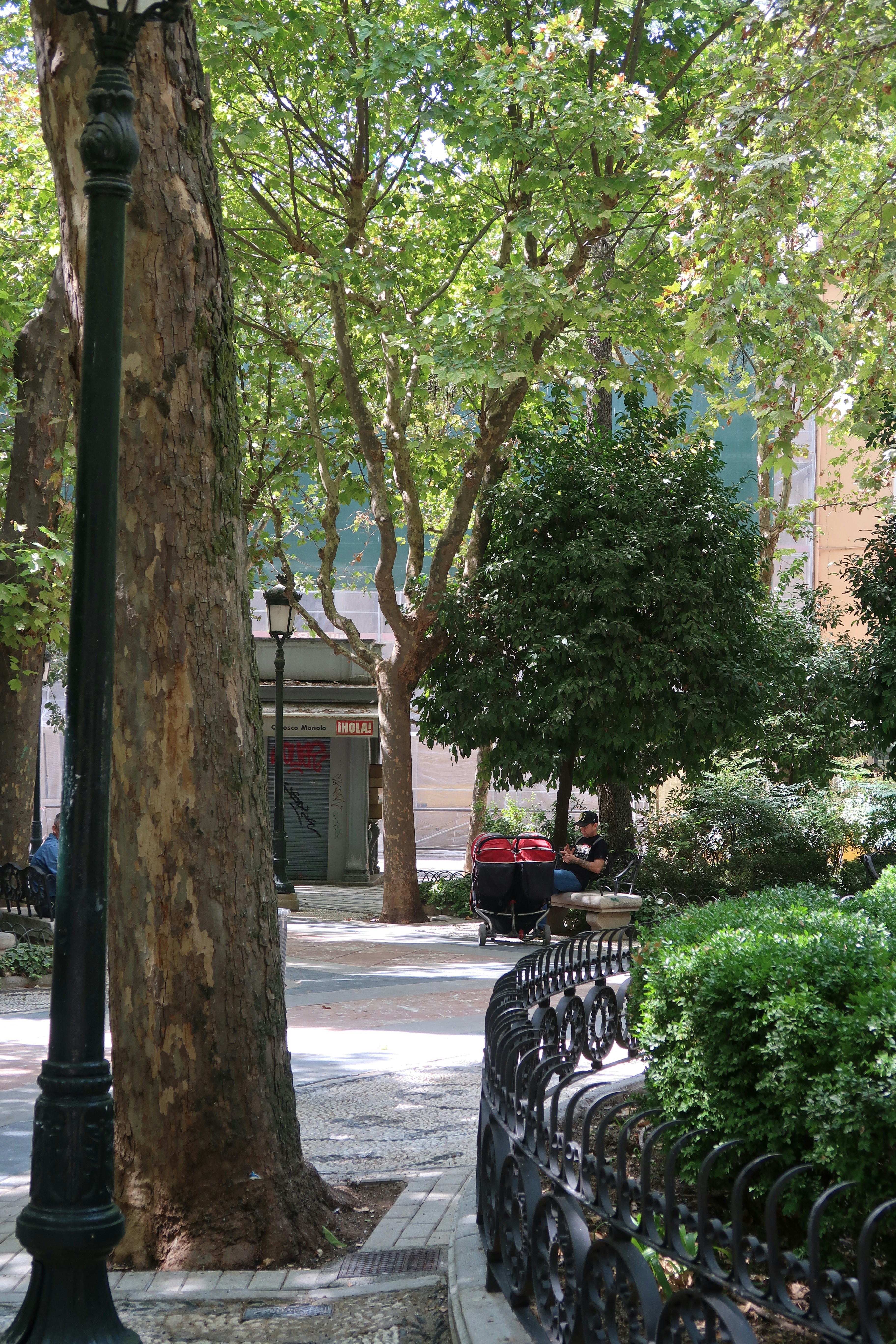 City Garden Gate: Shade, Stroller, and Street Quiet