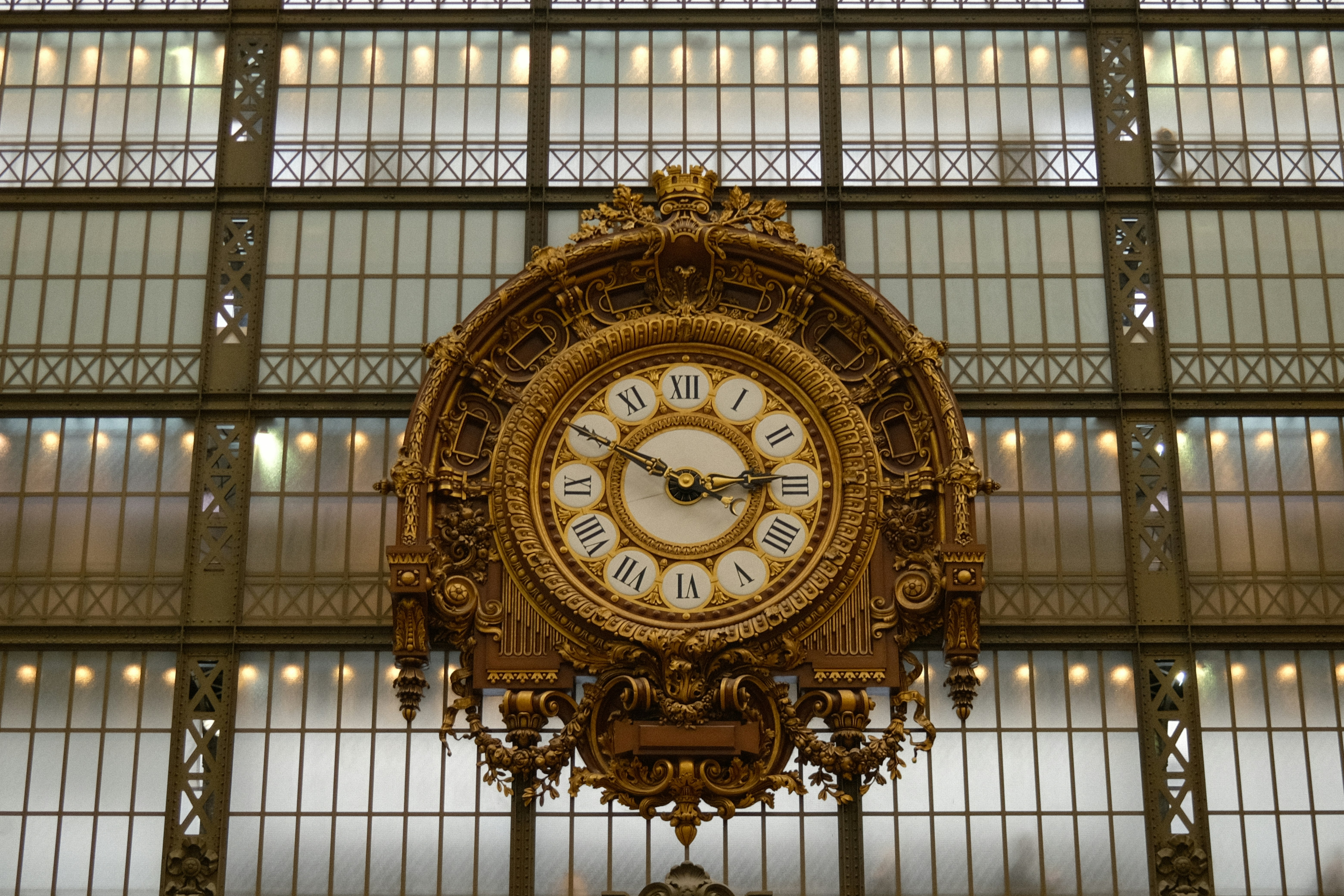 Gilded Clockwork Within a Glass Conservatory