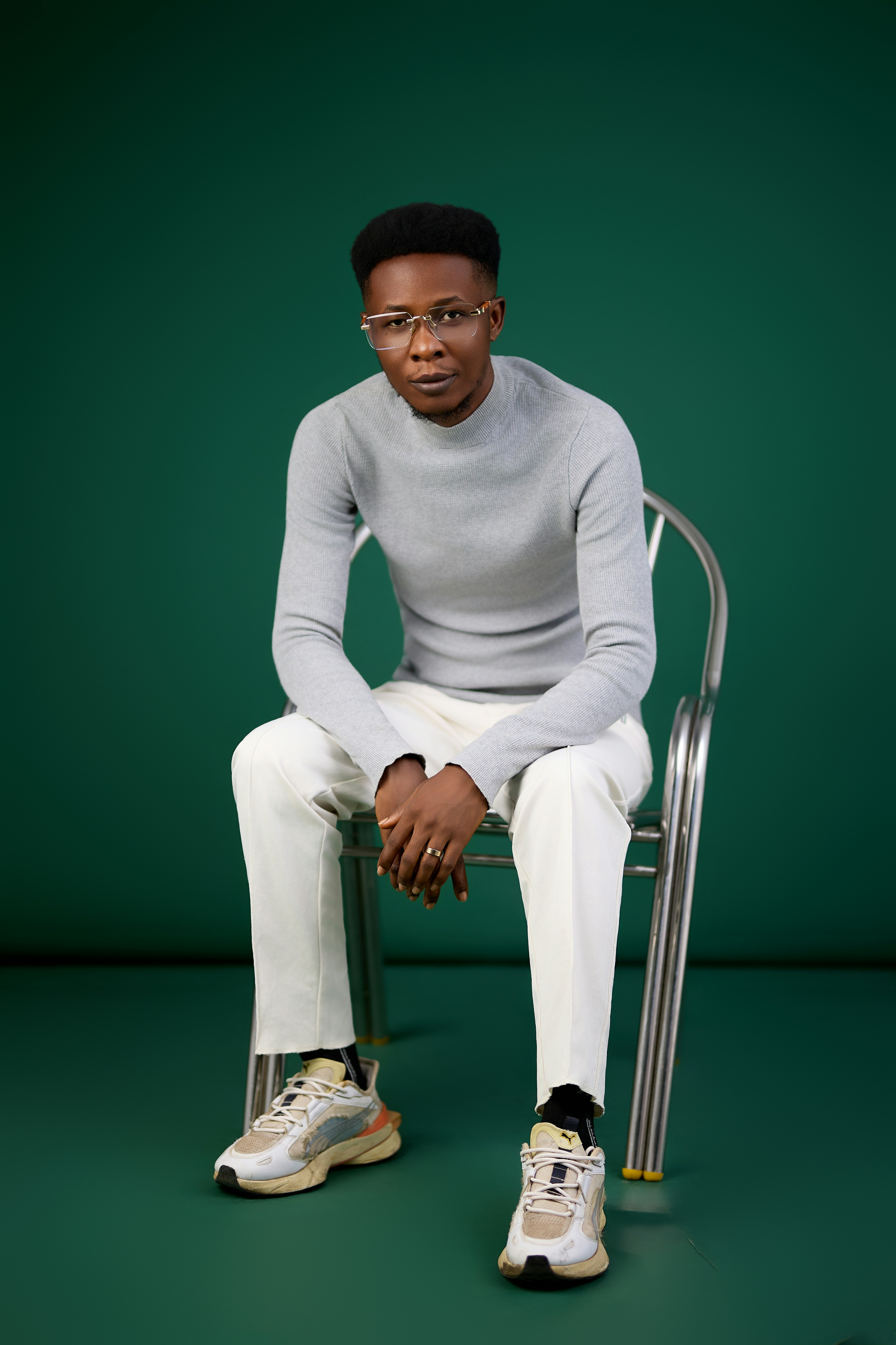 Quiet Confidence: Portrait of a Forward-Thinking Individual in a Minimal Studio