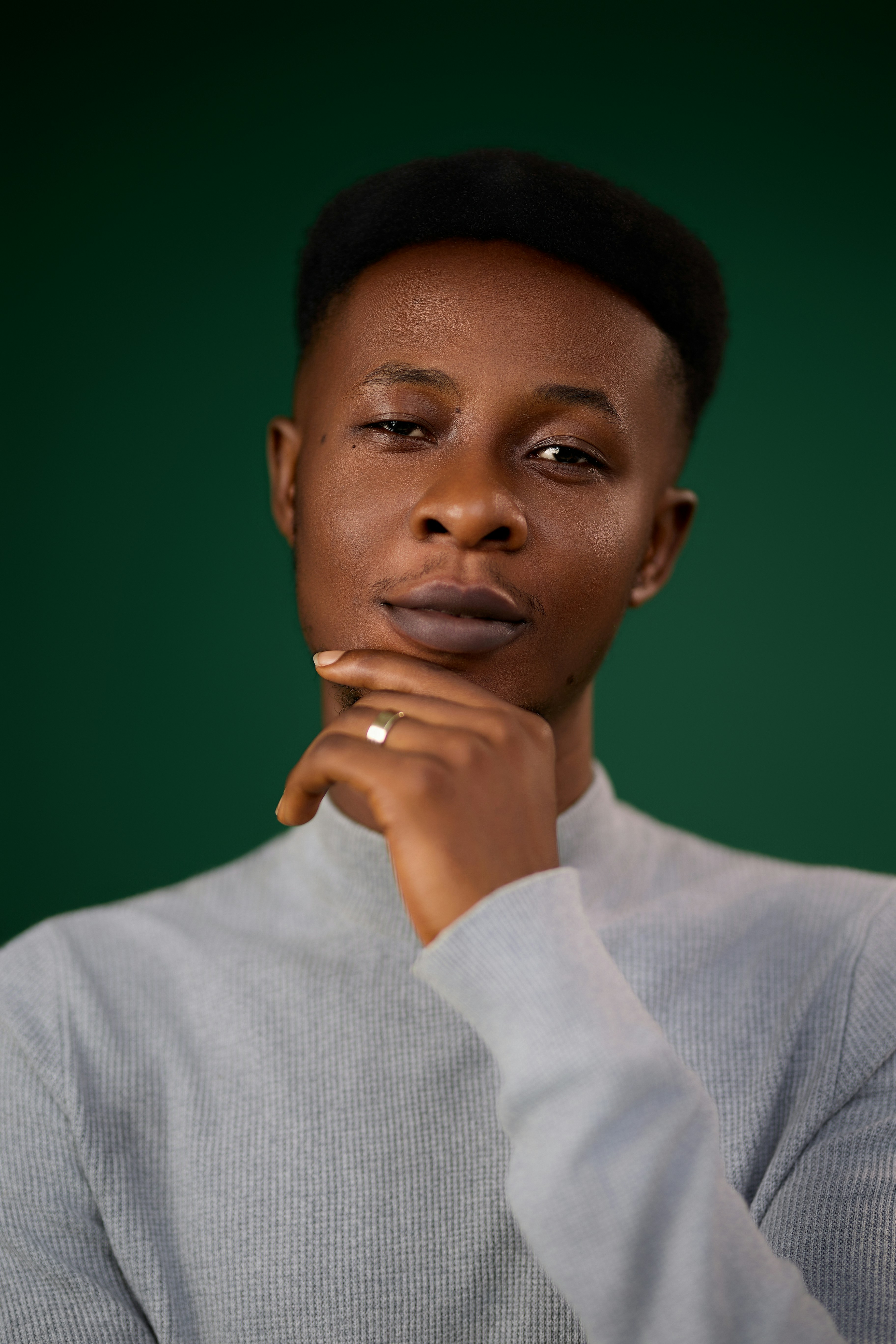 Contemplative Portrait in Deep Green