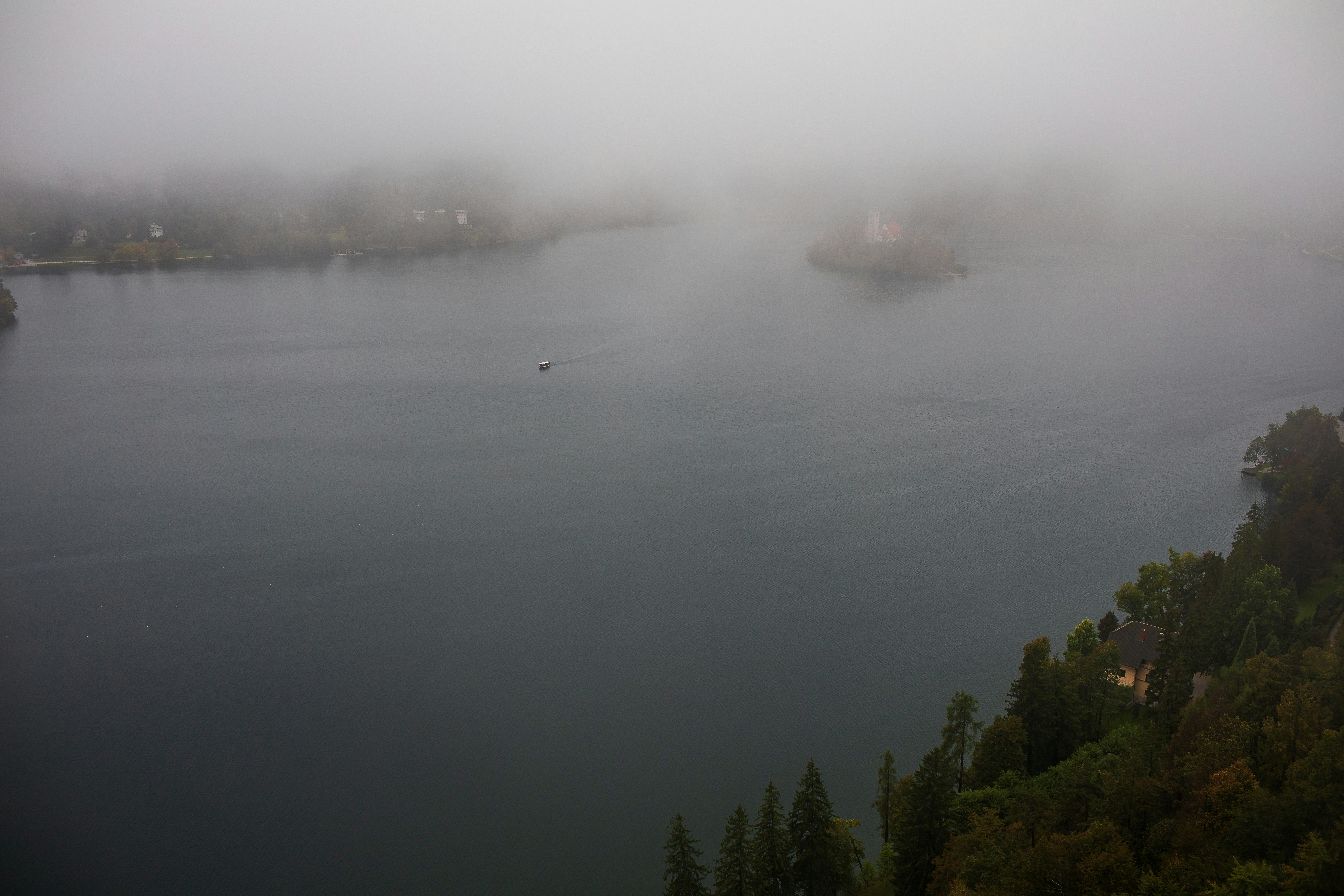 Misty Harbor: A Quiet Vessel Drifting Through Quiet Waters