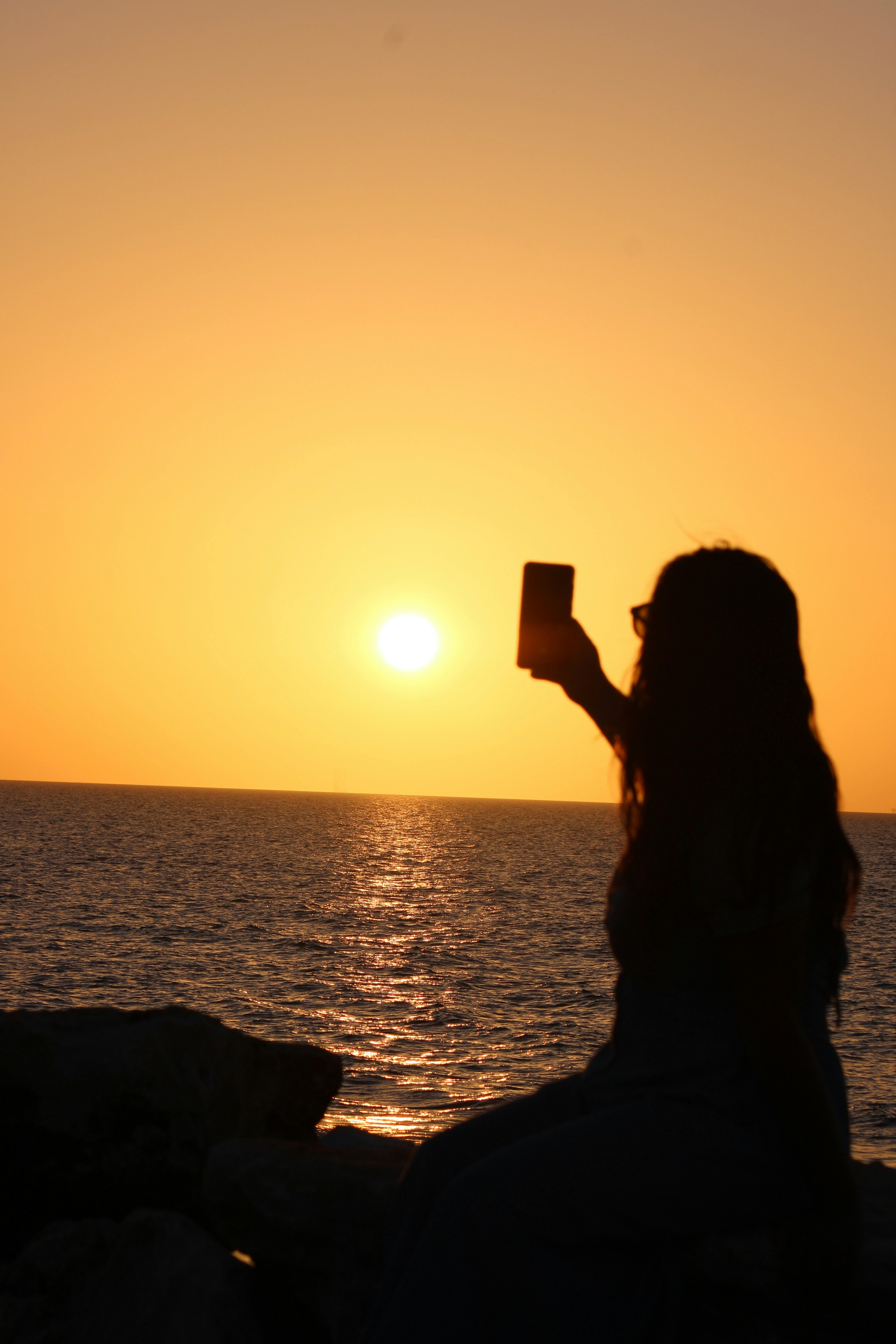 Sunset Silhouette: A Selfie with the Horizon