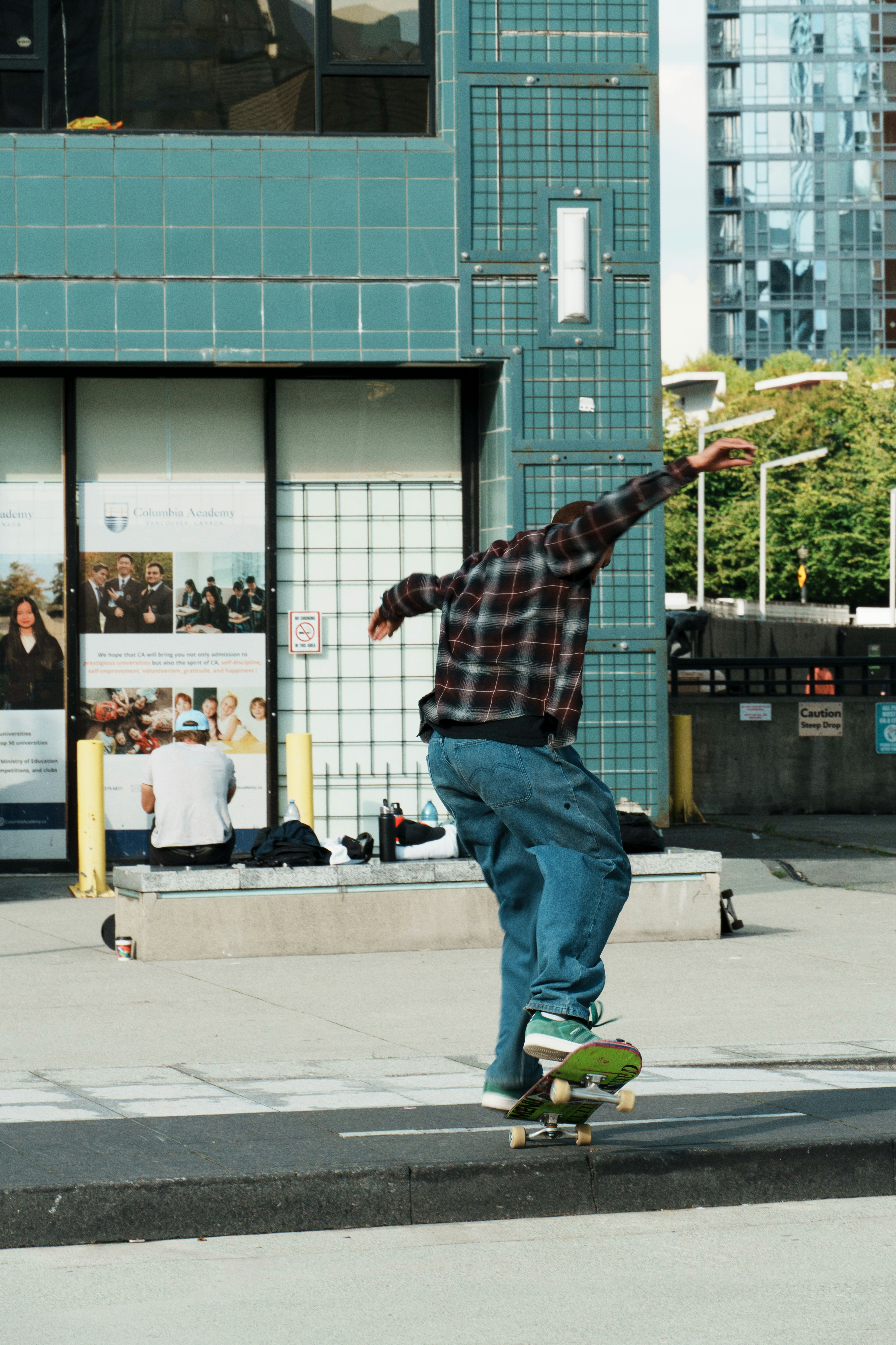 Skateboarder in motion against urban backdrop