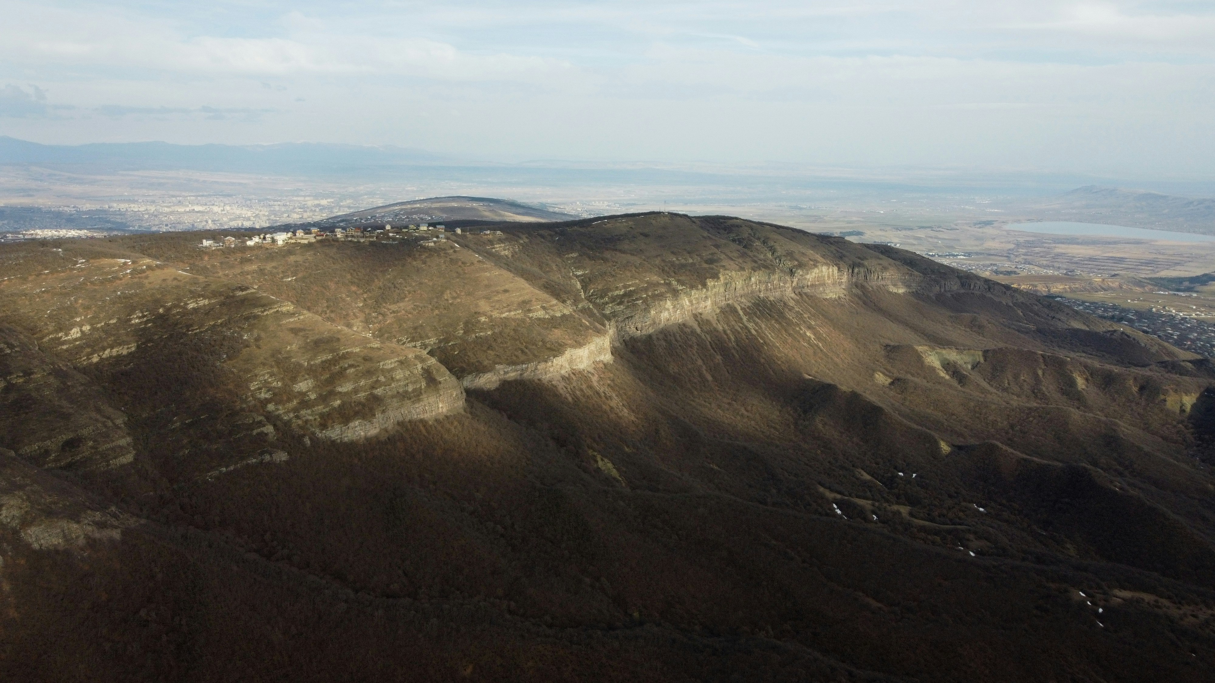 Wind-sculpted Ridge Overlook at Distant Plain