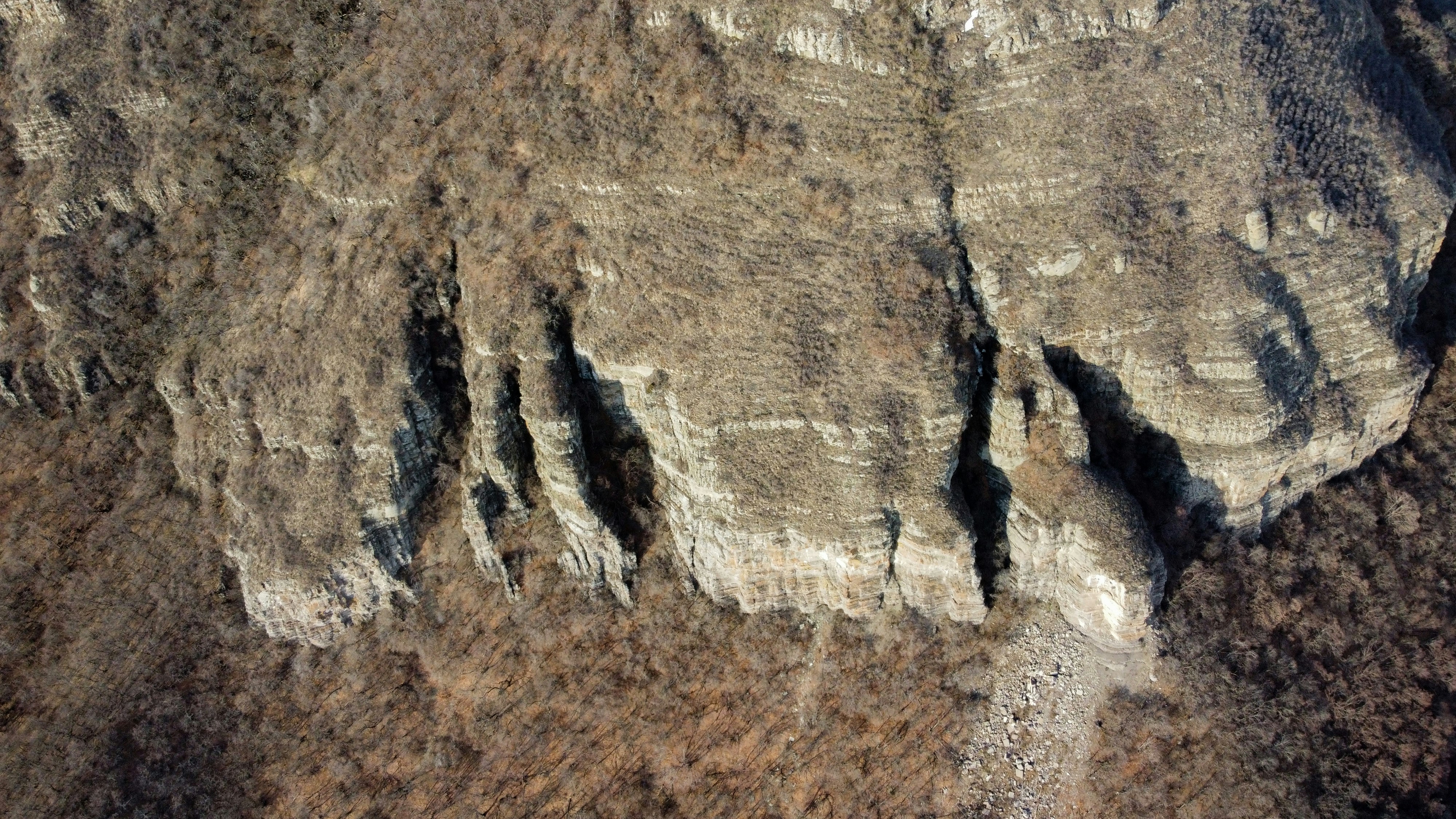 Rugged Canyon Facade: weathered cliff lines carved by time