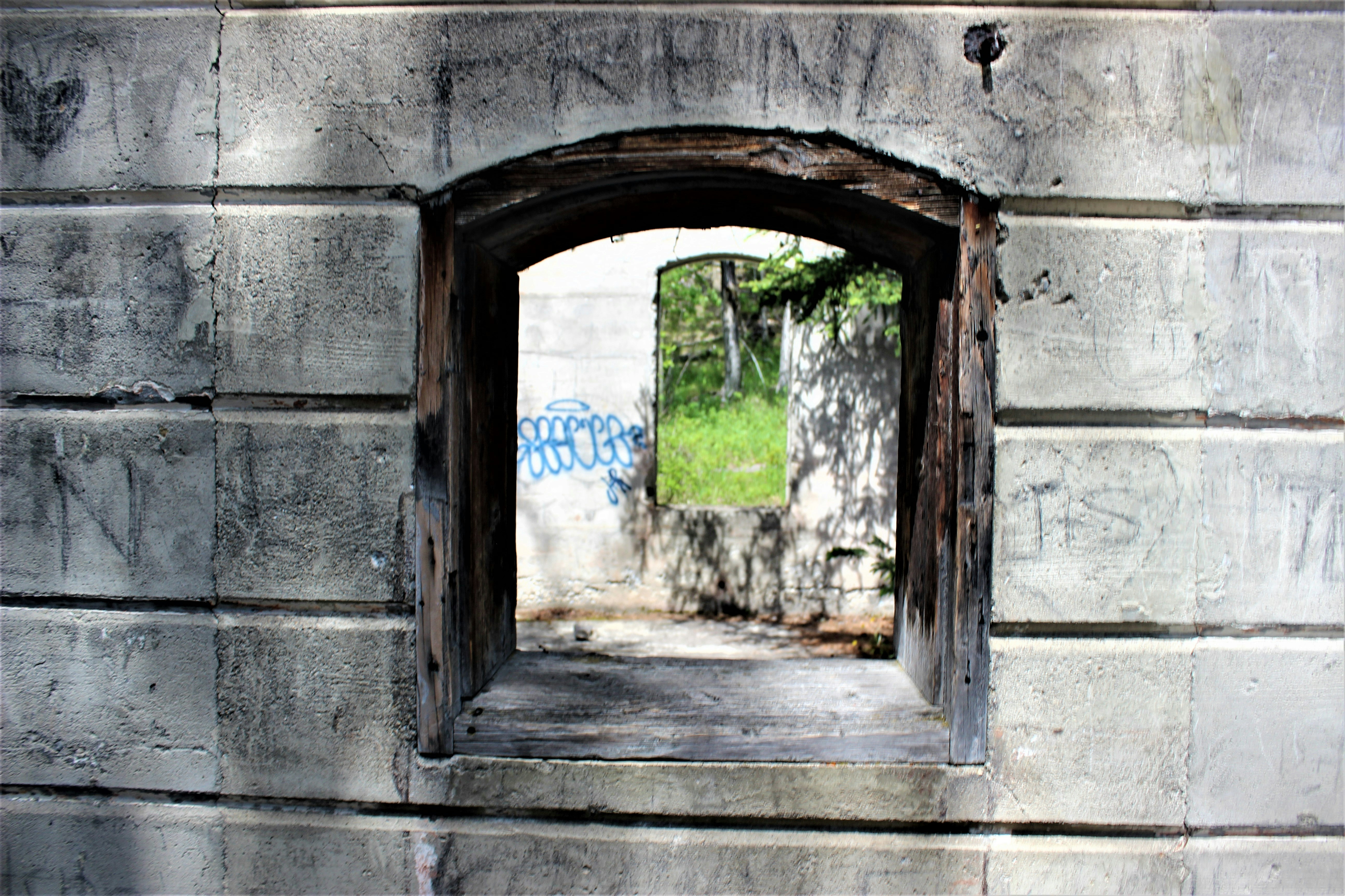 Through the Cracked Arch: A Window into Decay