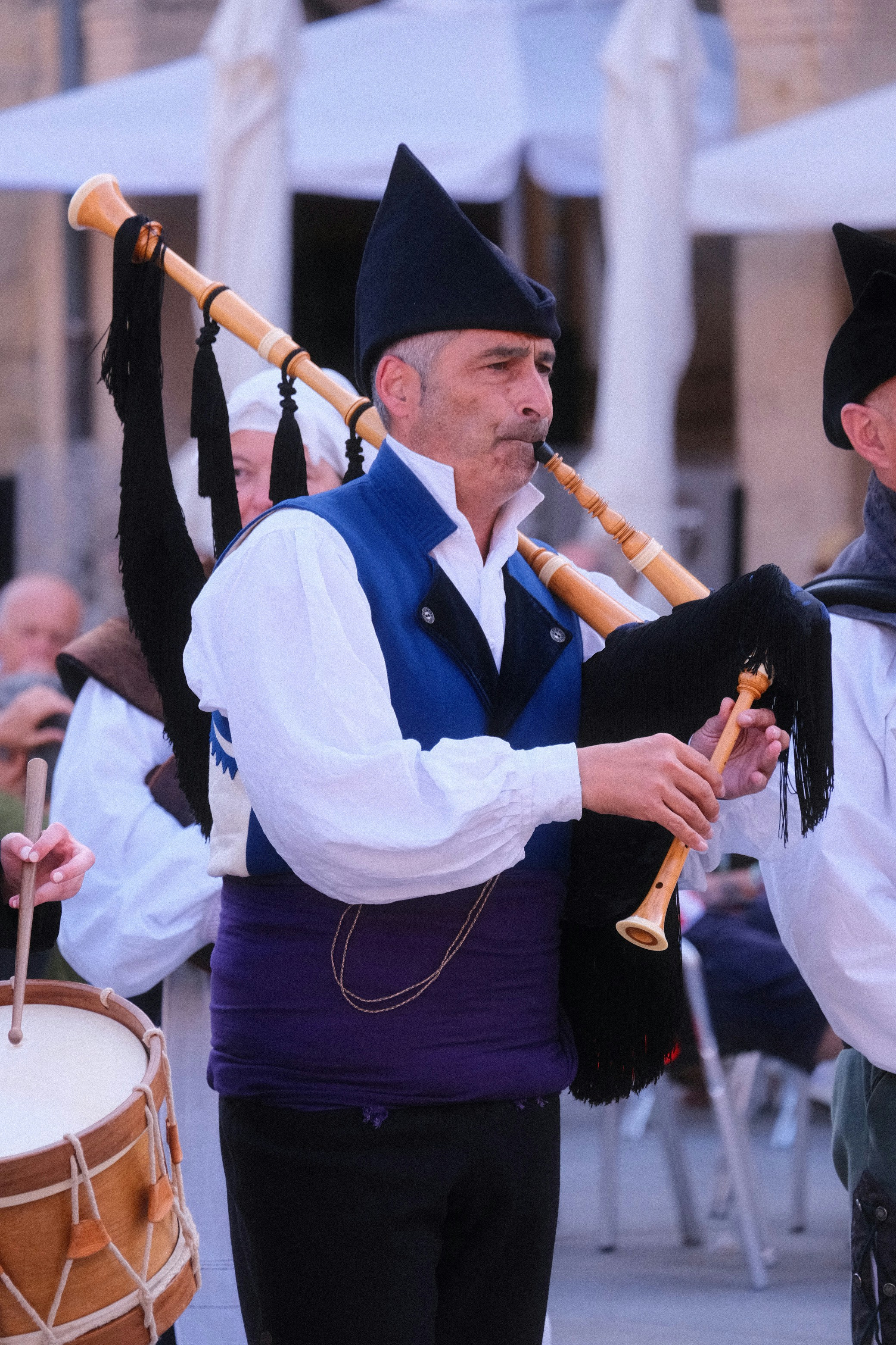 Melodic Tune in Traditional Attire: A Bagpipe Player in Focus