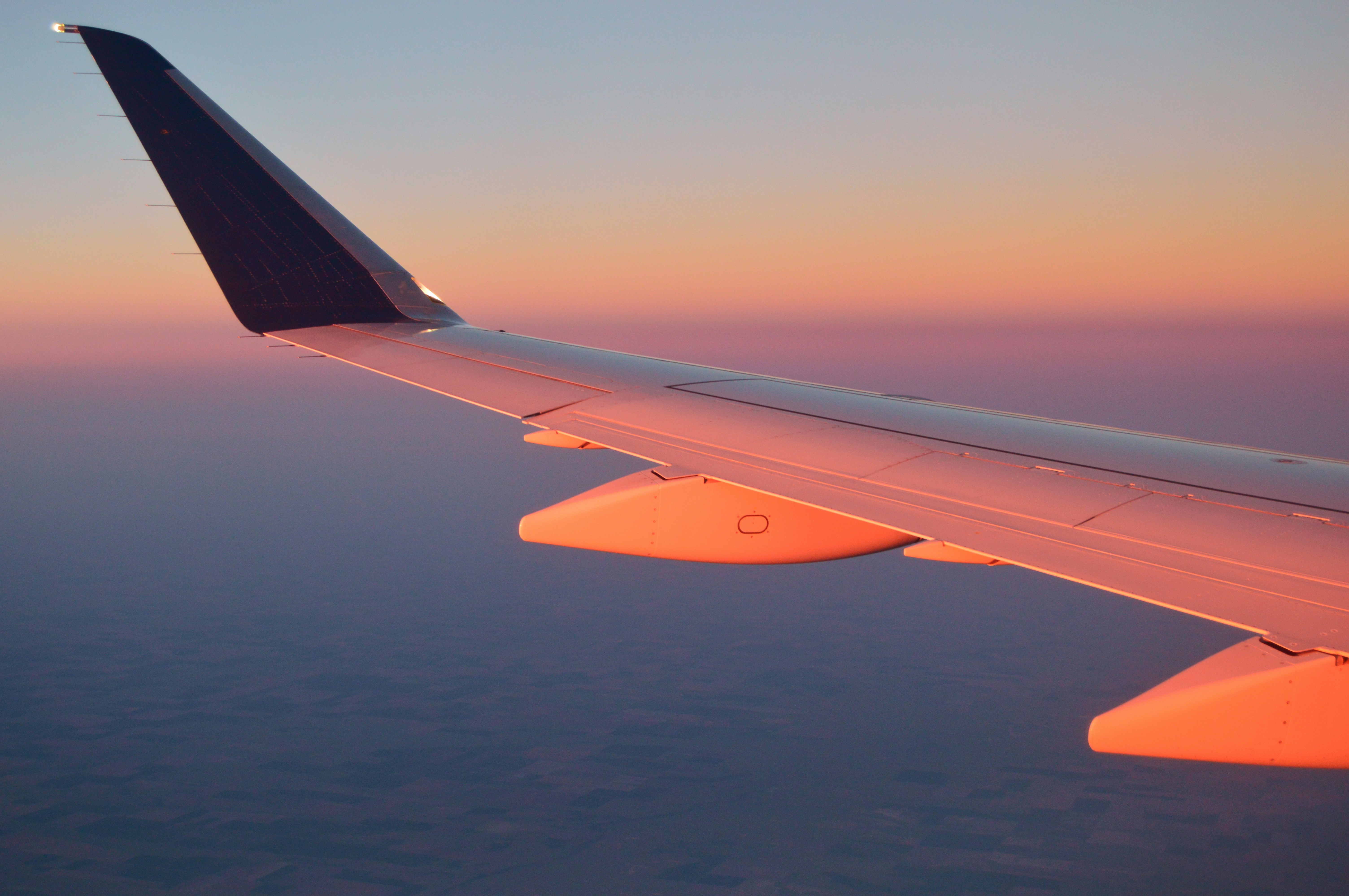 Sunset Wing: Quiet Horizon from a Flying Window