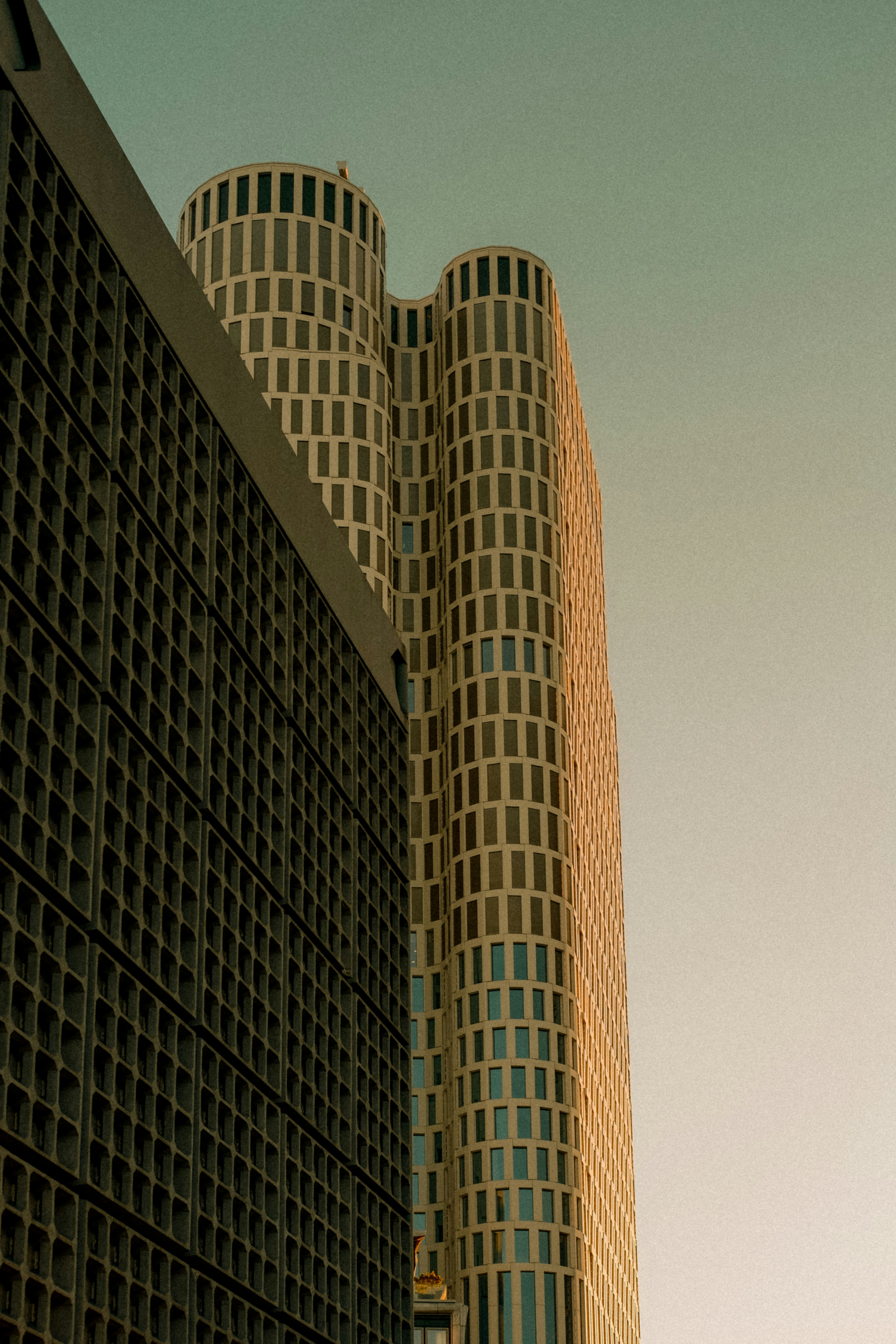 Twin Cylinders Towering at Dusk