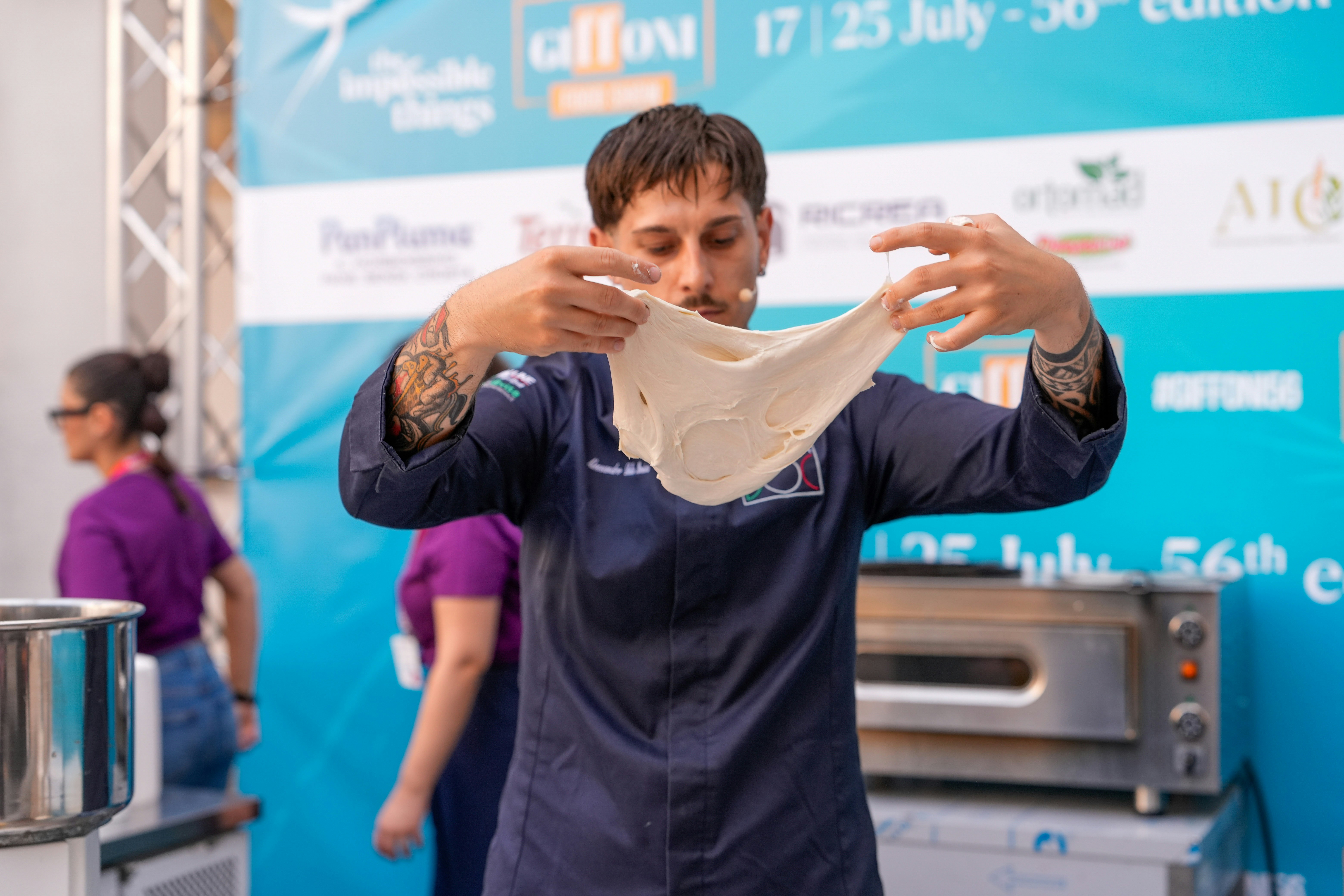 Stretching Dough, Framed: A Barista-Style Demonstration at the Market Stall