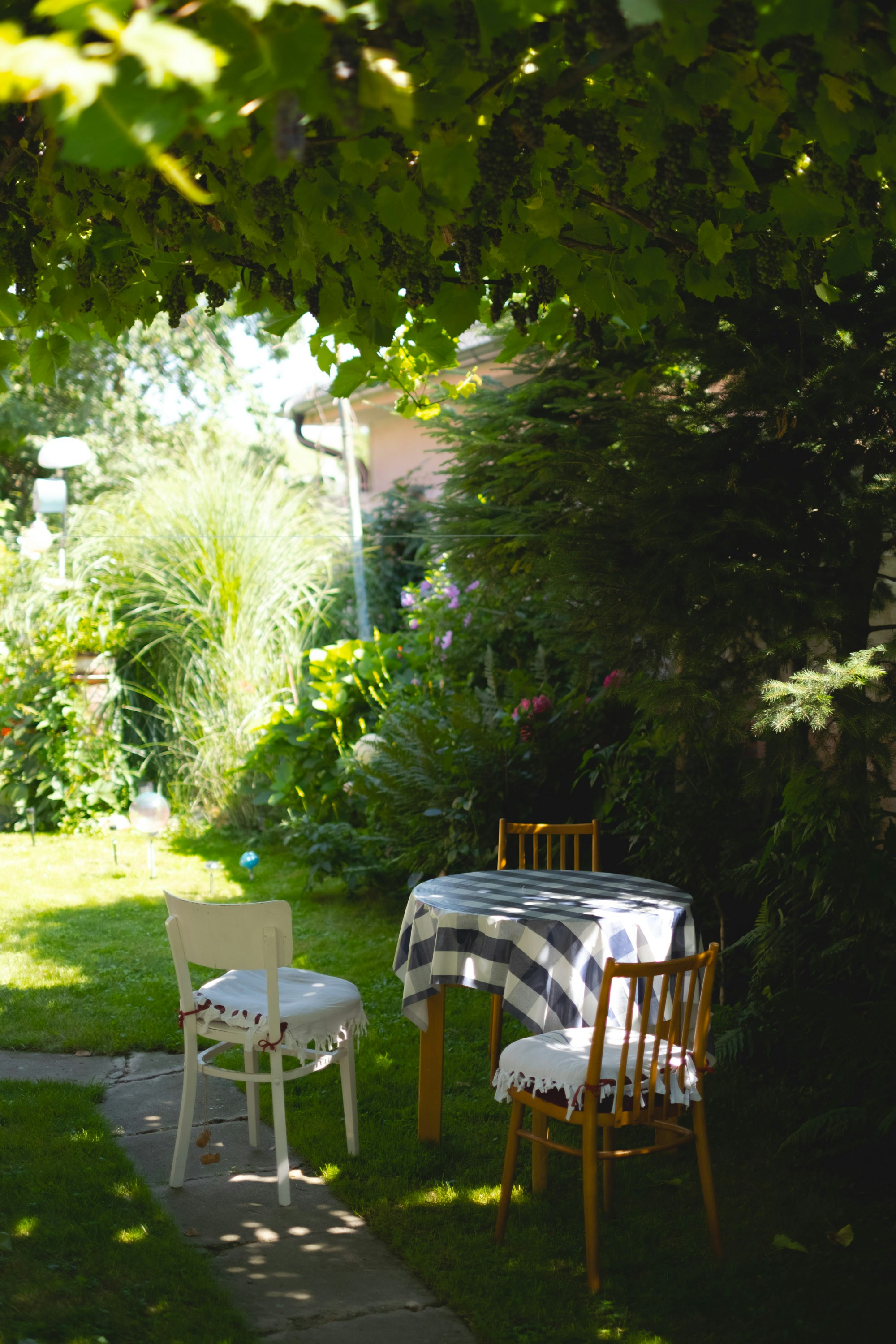 Sunlit Garden Table Set under Dappled Shade