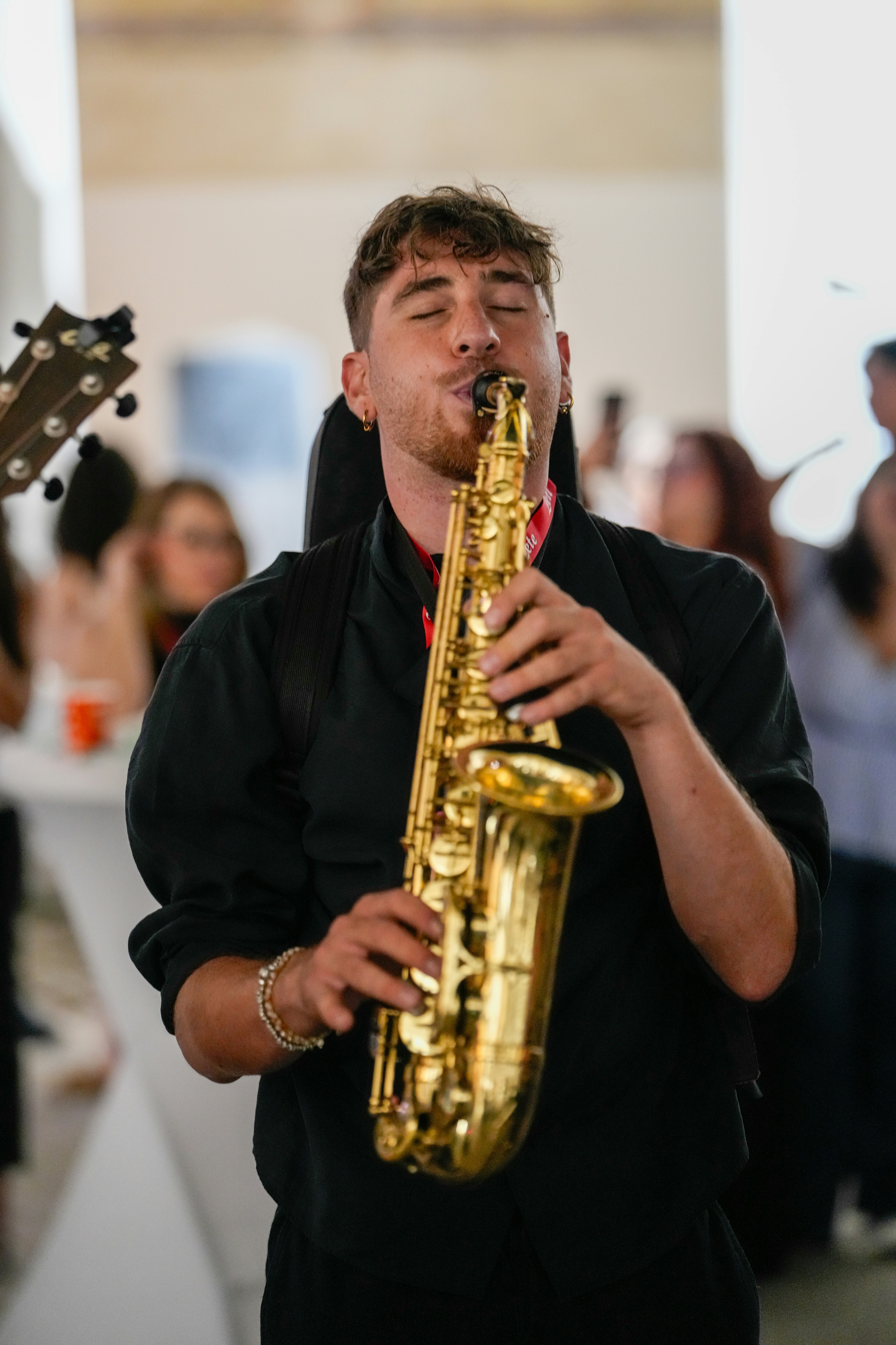 Saxophone Serenade: Moment of Breath in a Live Crowd