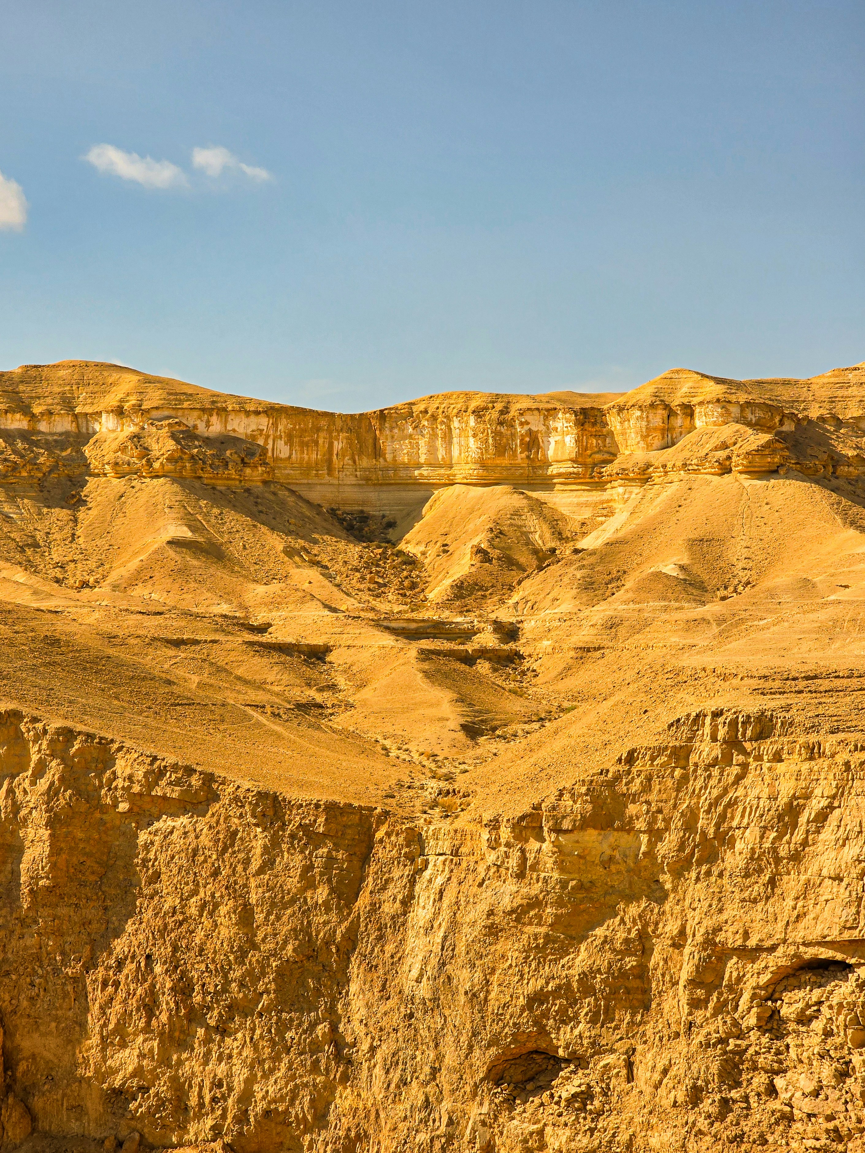 Golden Canyon: Eroded Strata under a Quiet Sky