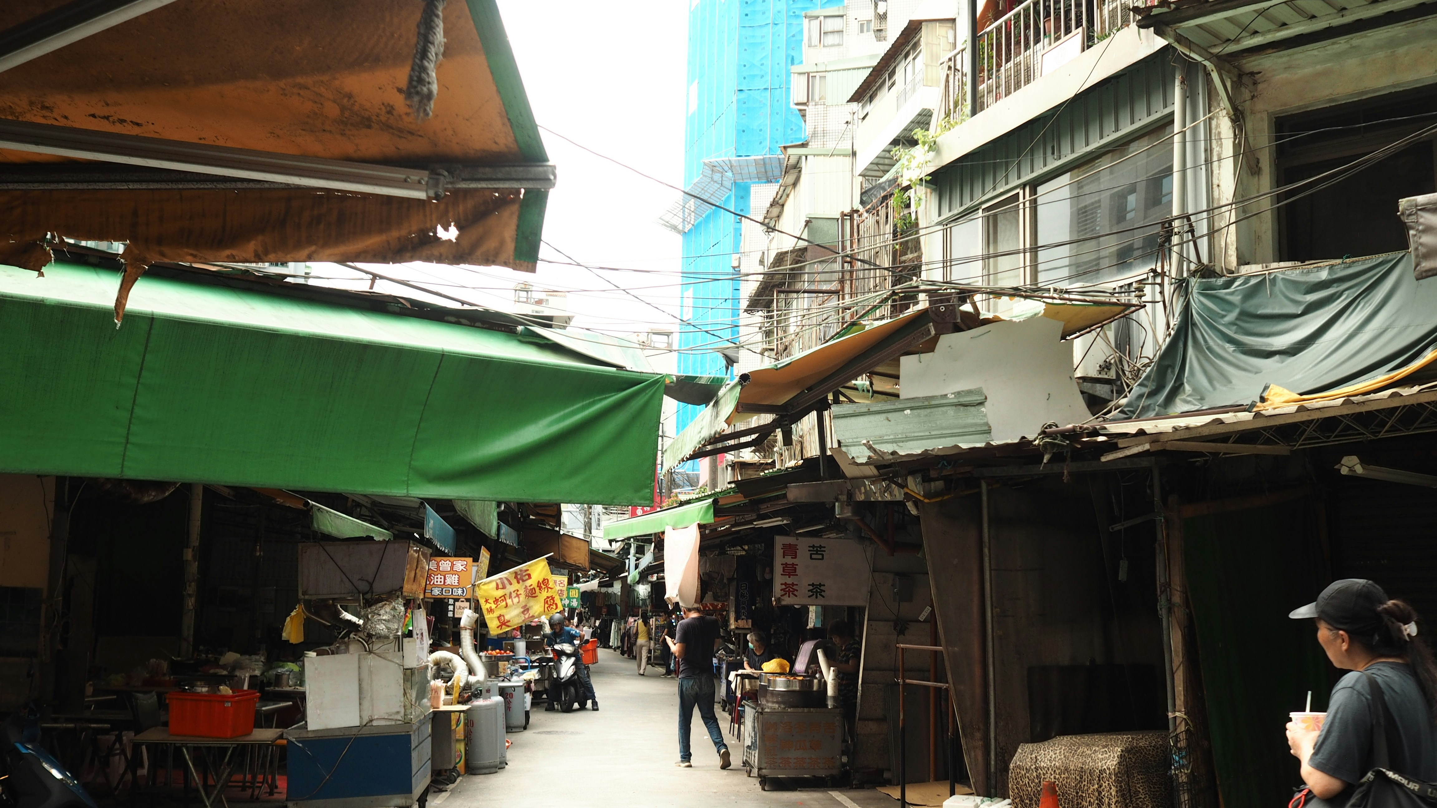 Market Corridor Under Green Canopies