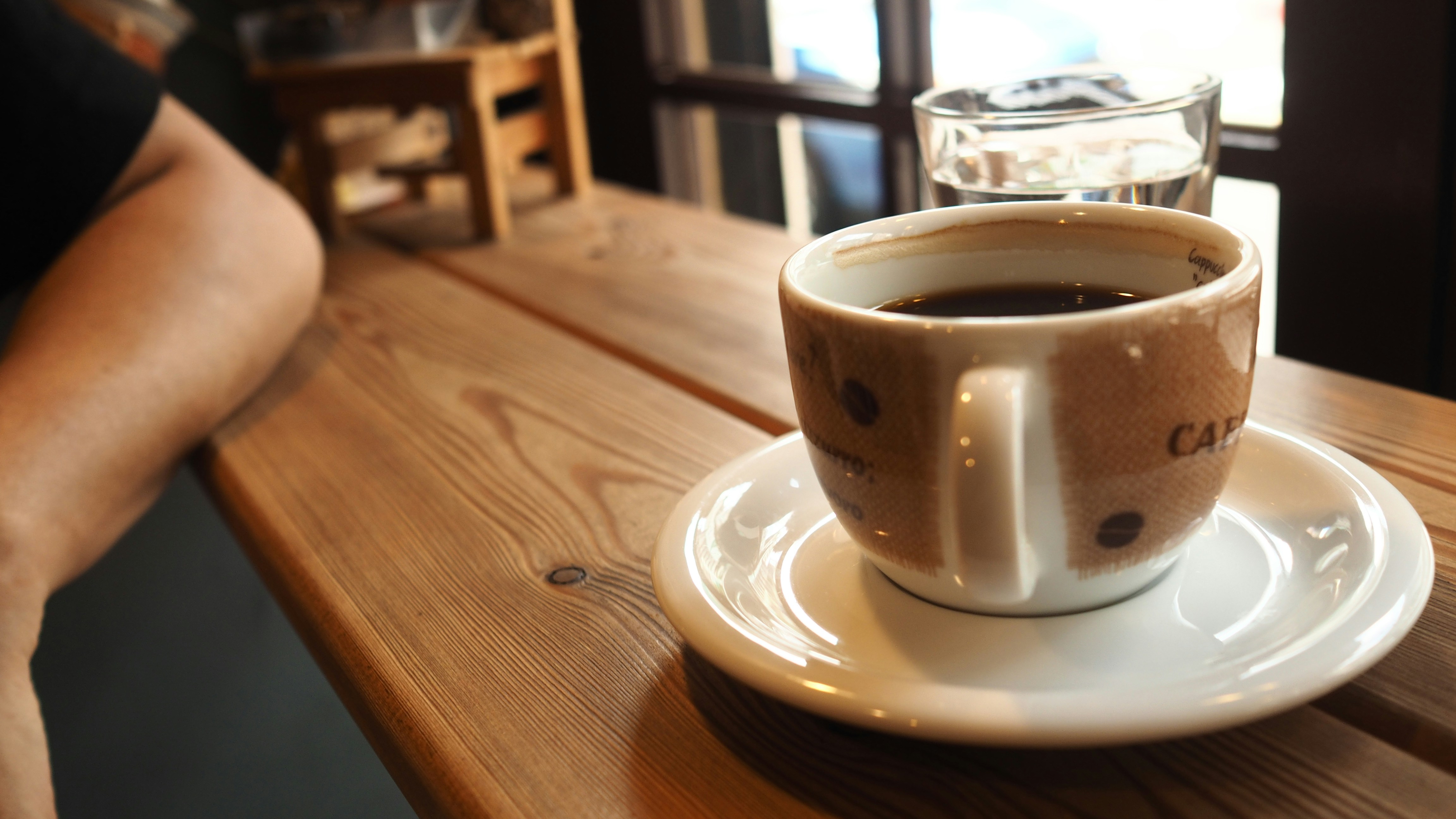 Cafe Moment: A Cup of Italian Roast on a Wooden Counter