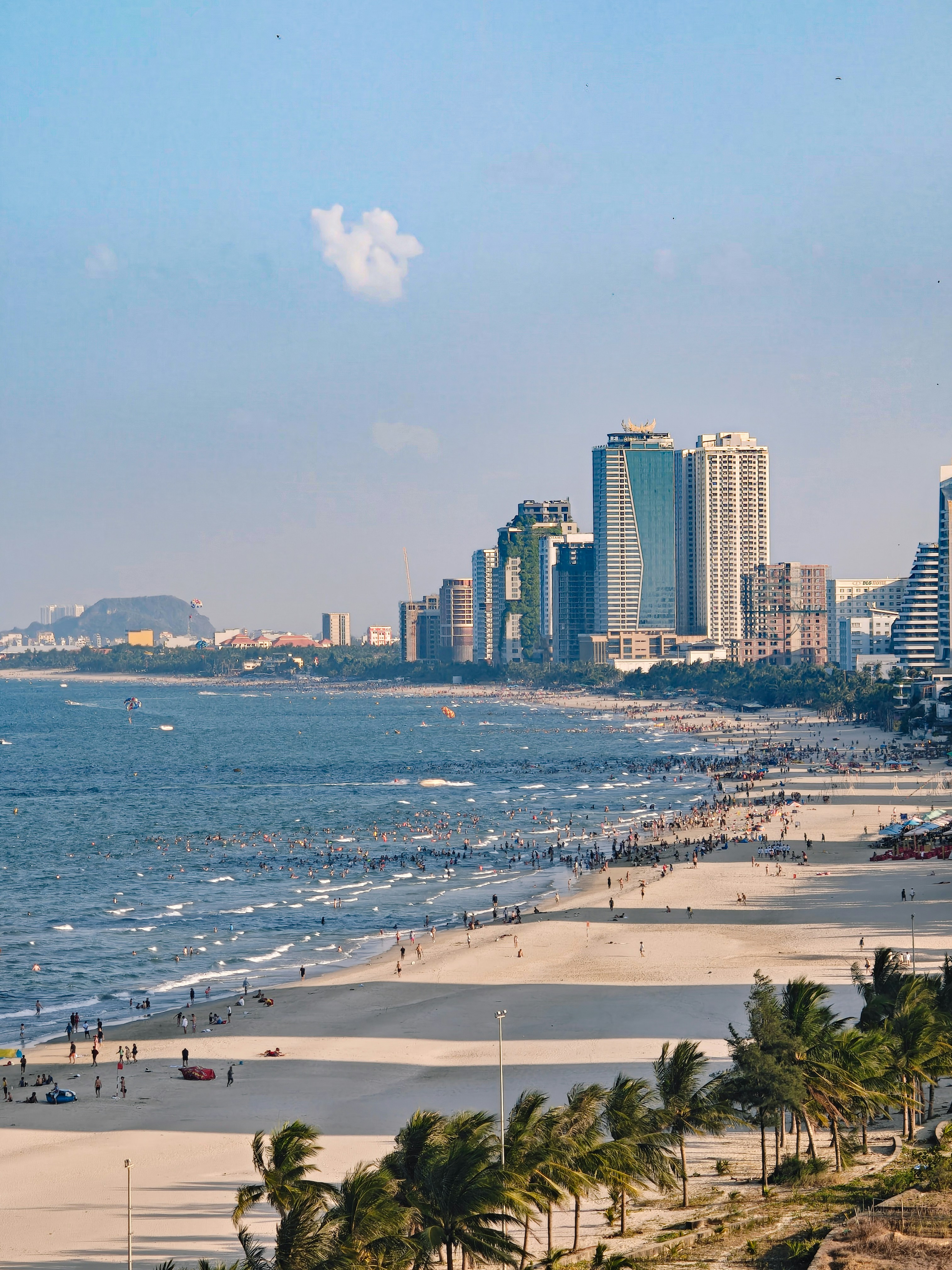 Sunlit Beachfront Towers: A Coastal City Portrait
