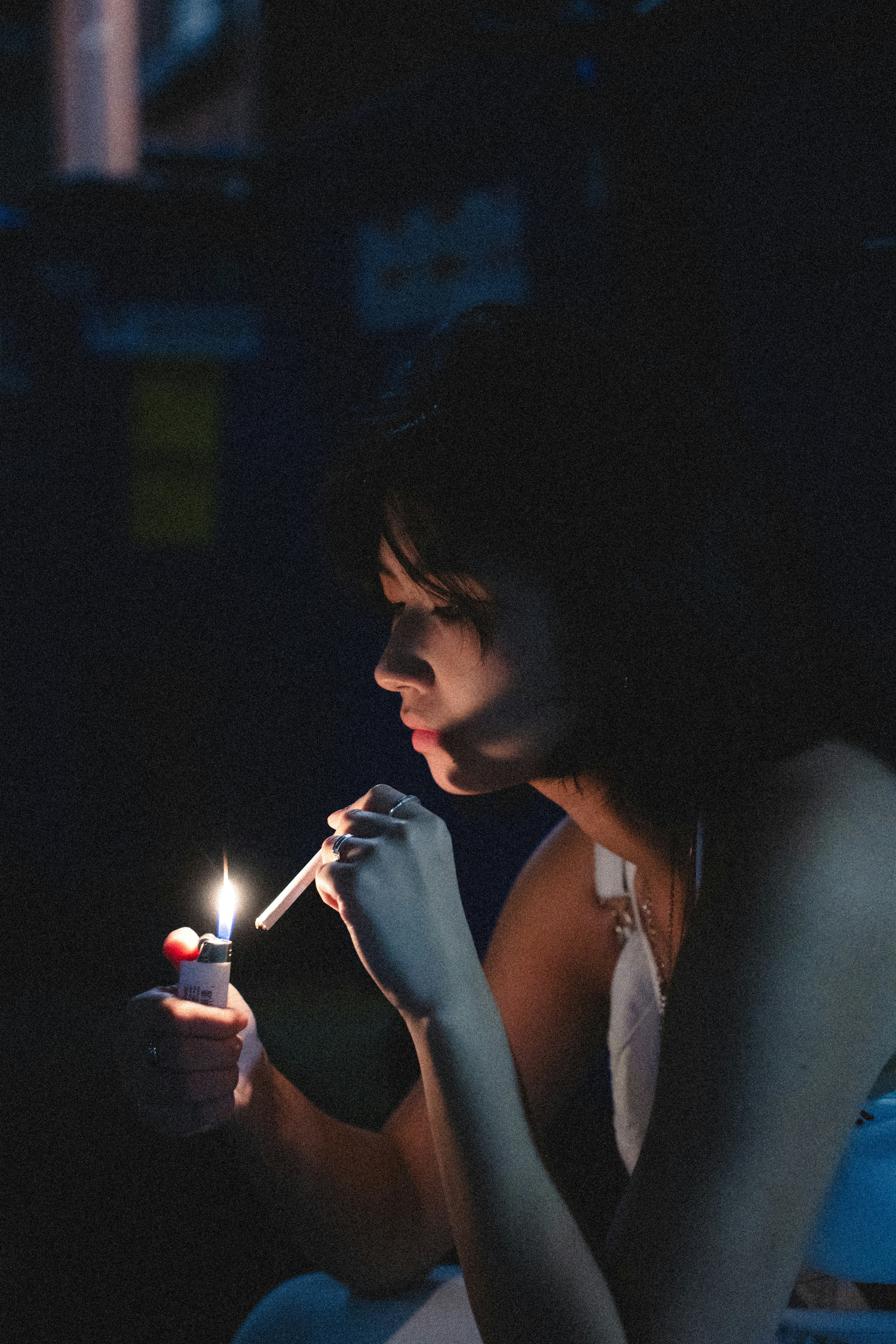 Dawn of a Whisper: Lighting a Cigarette in the Night
