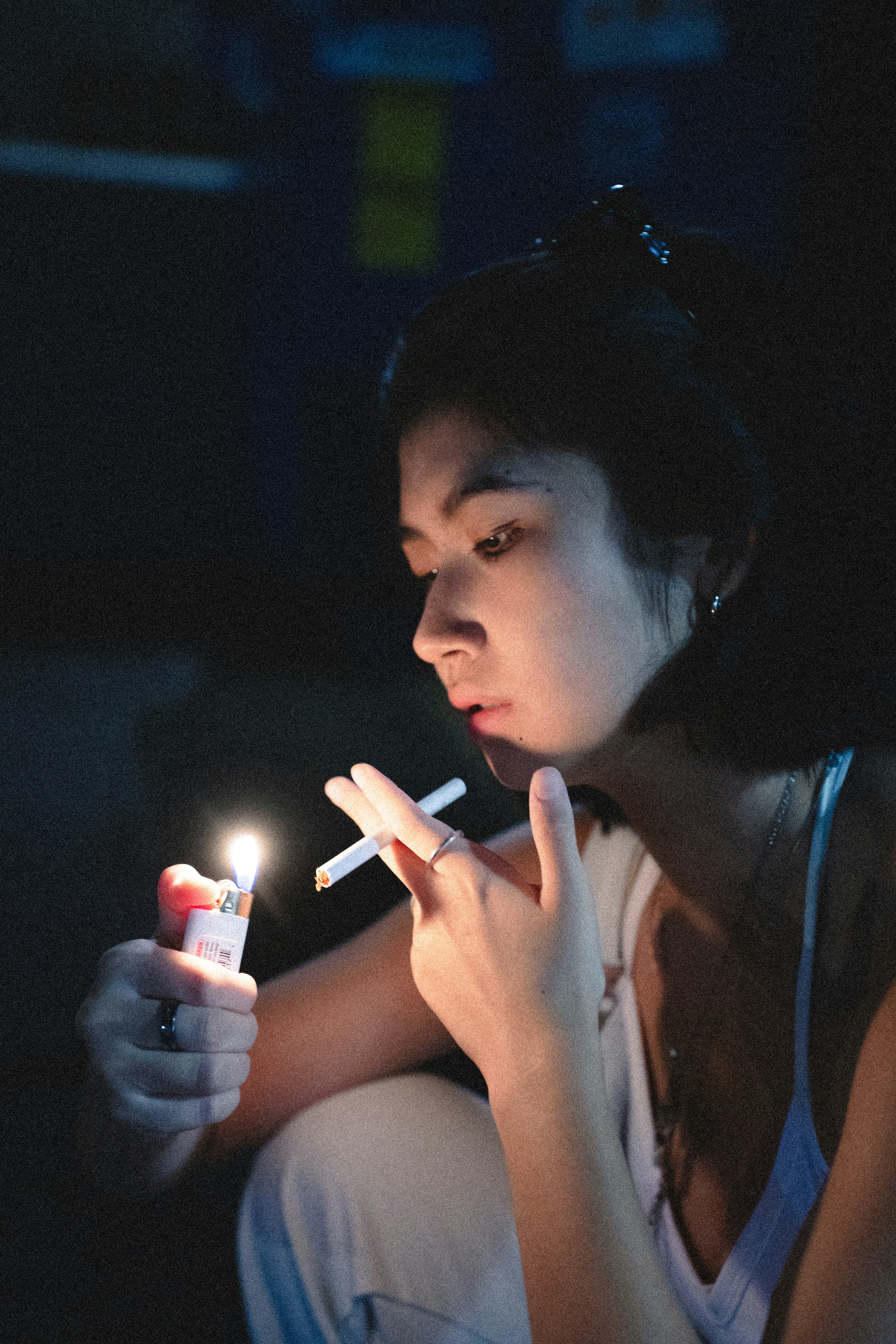 Midnight Sparks: A Quiet Moment with a Lit Cigarette