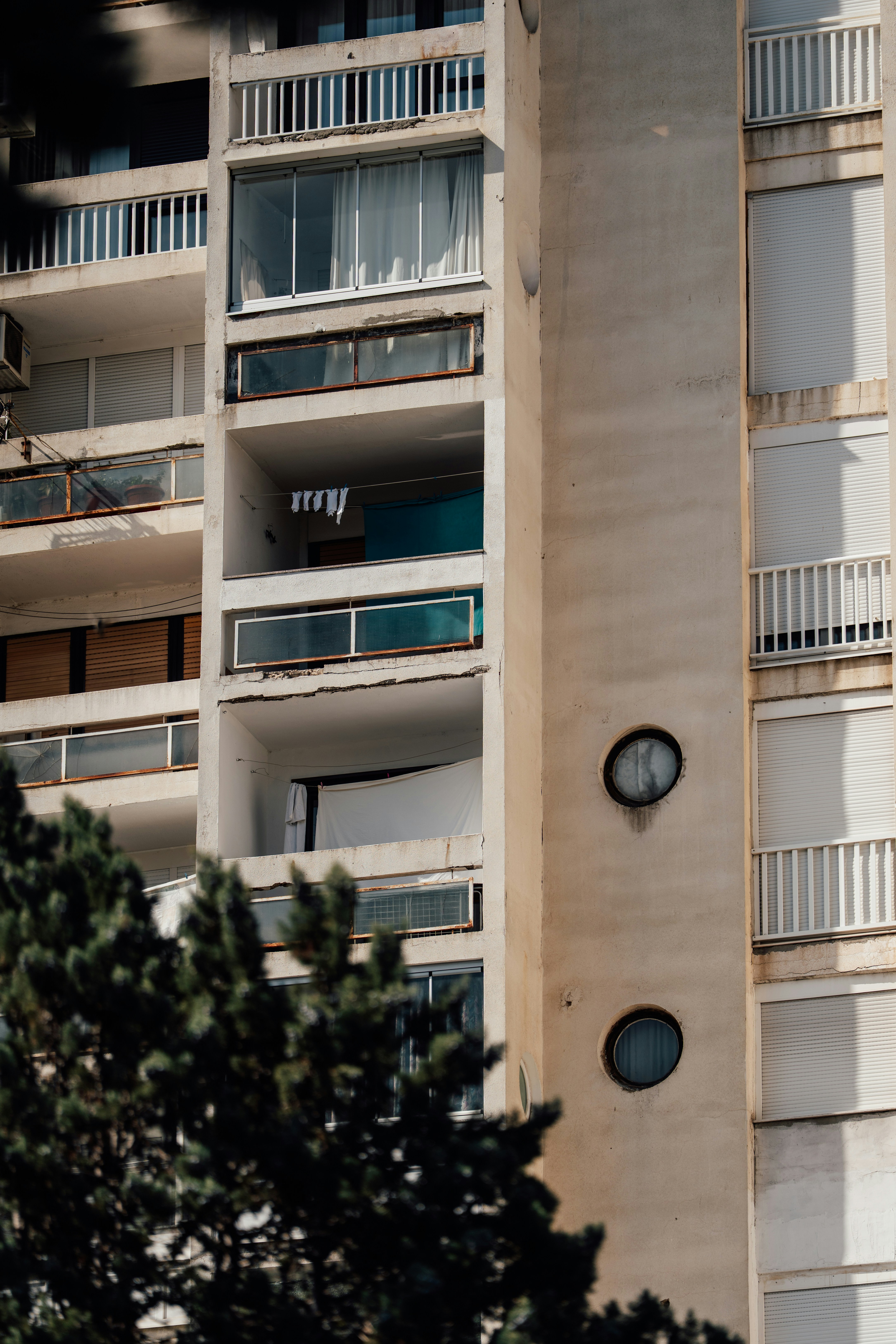 Concrete Echoes: A Facade of Balconies and Time