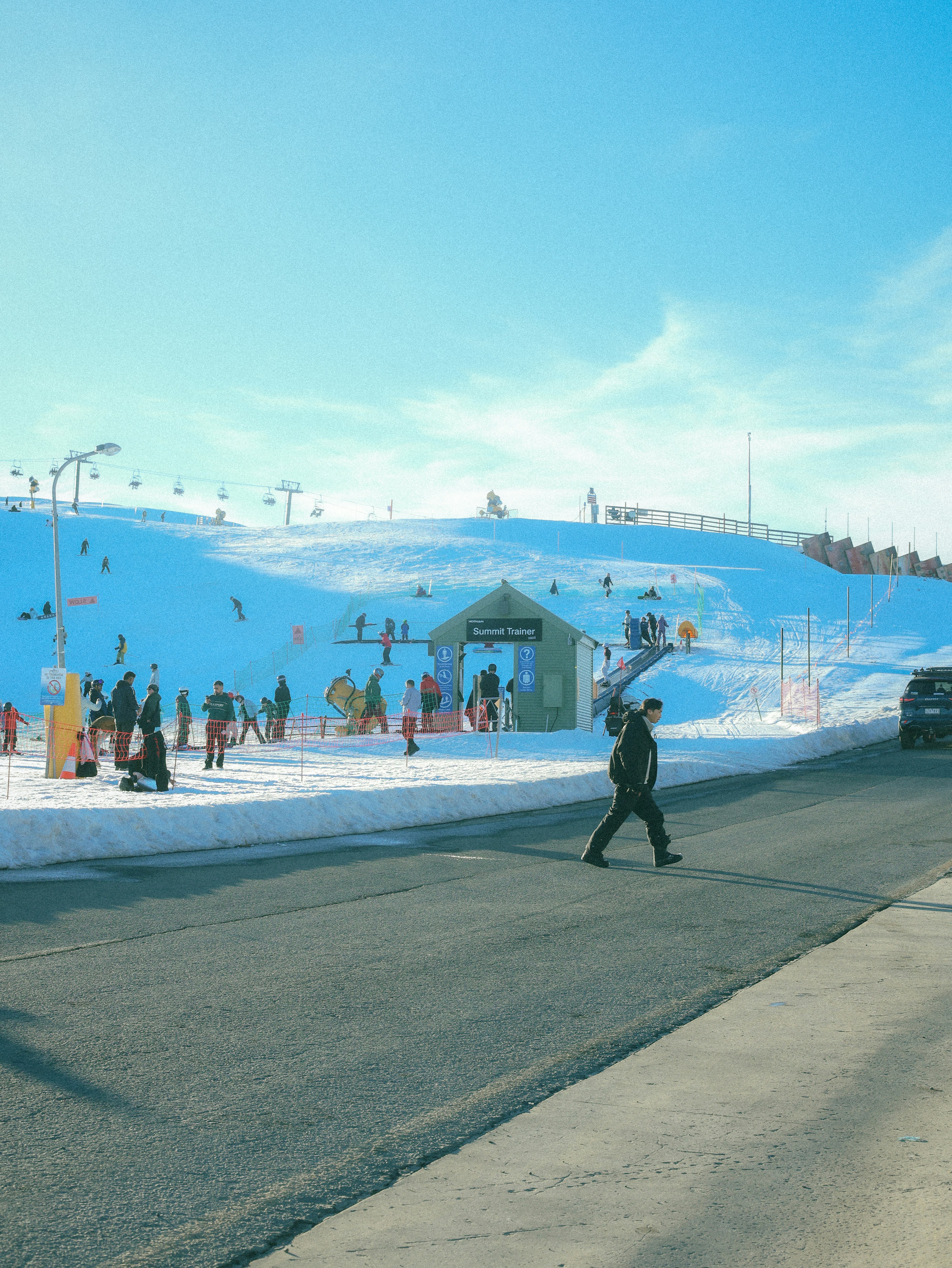 Snow Hill Subway: People and Ski Lift Beneath a Blue Sky