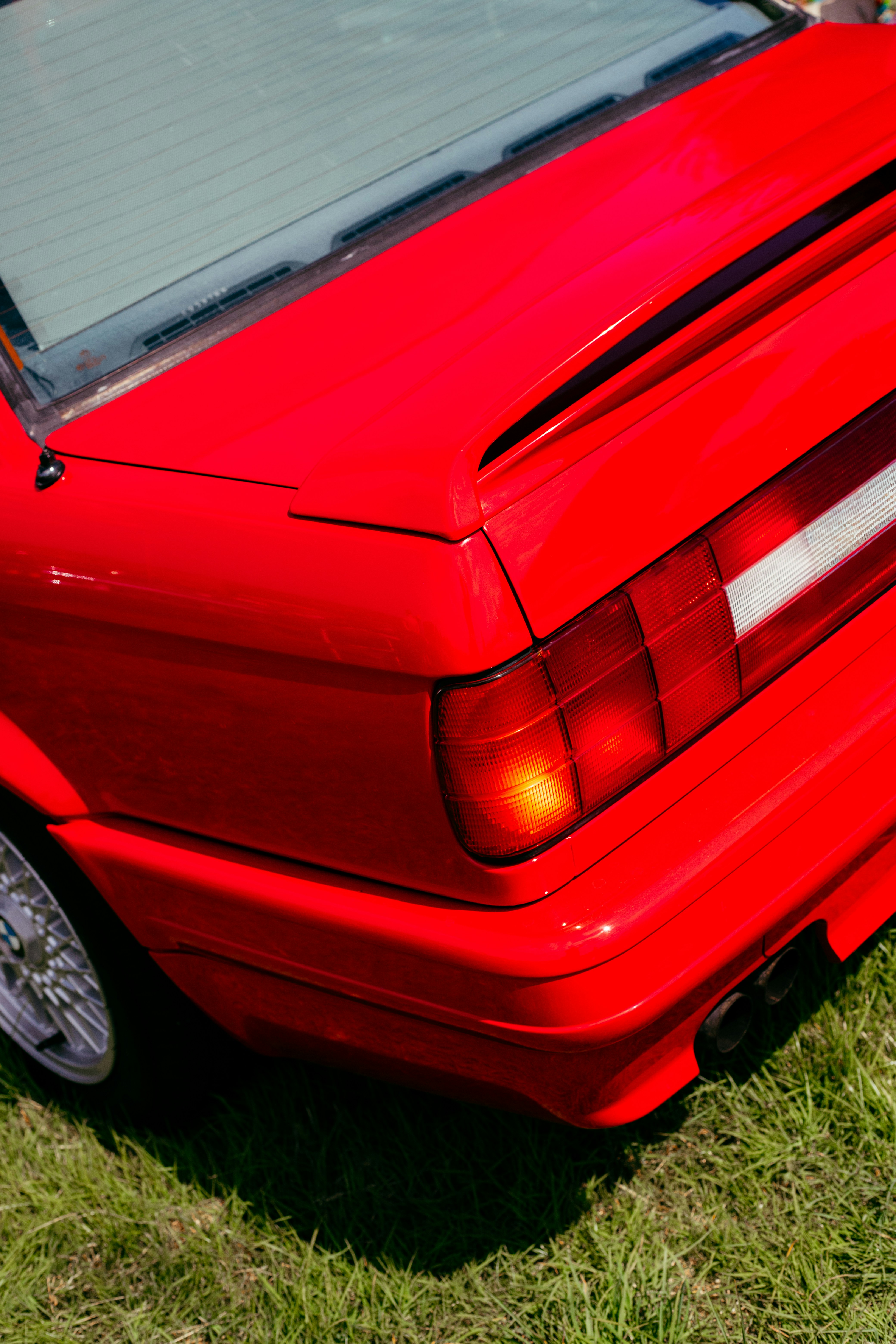 Red Luster: The Sharp Lines and Tailfin of a Classic Sports Car