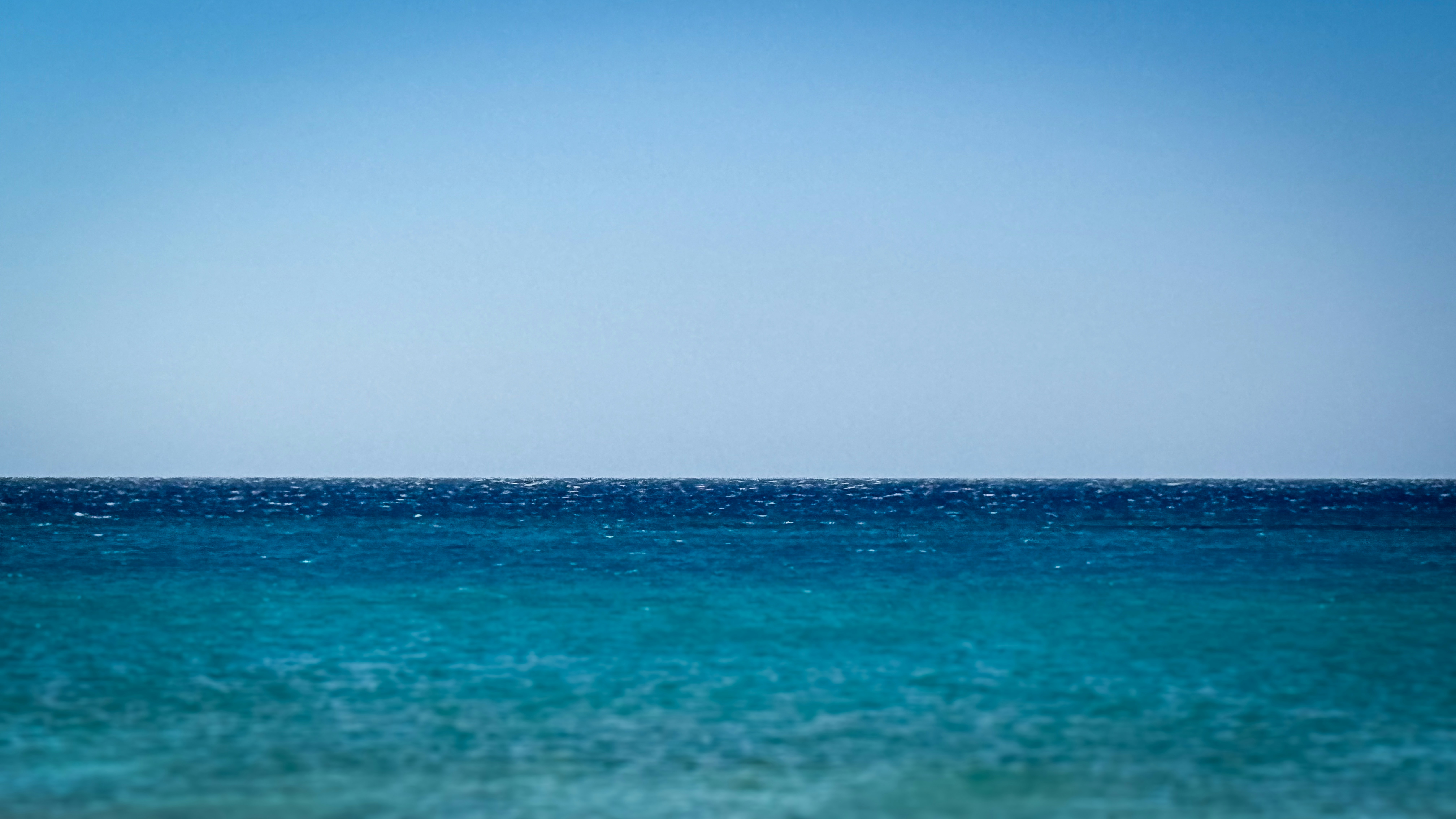 Midday Horizon: A Calm Sea Meeting the Sky