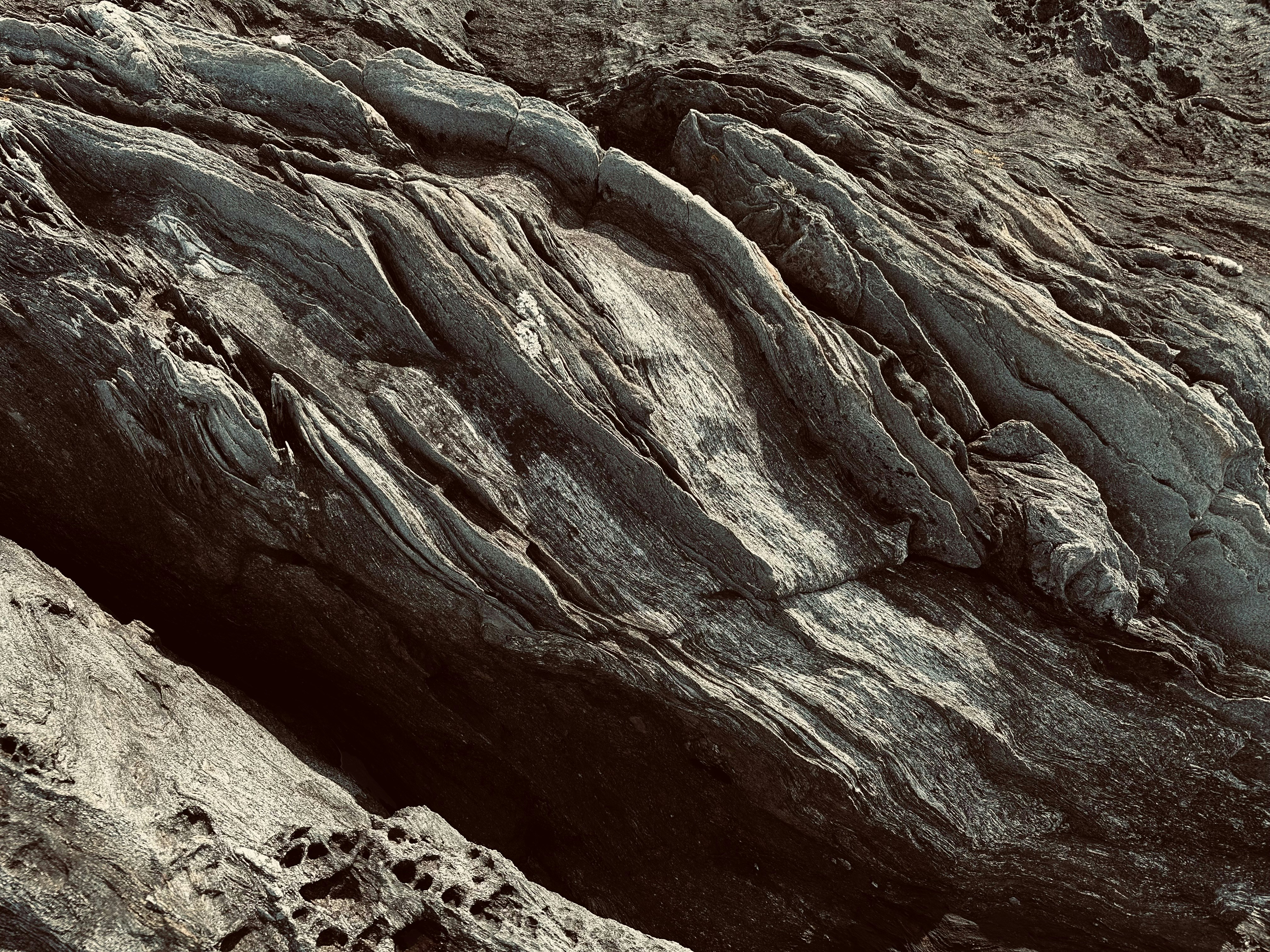 Striated Granite Waves on a Mountain Face