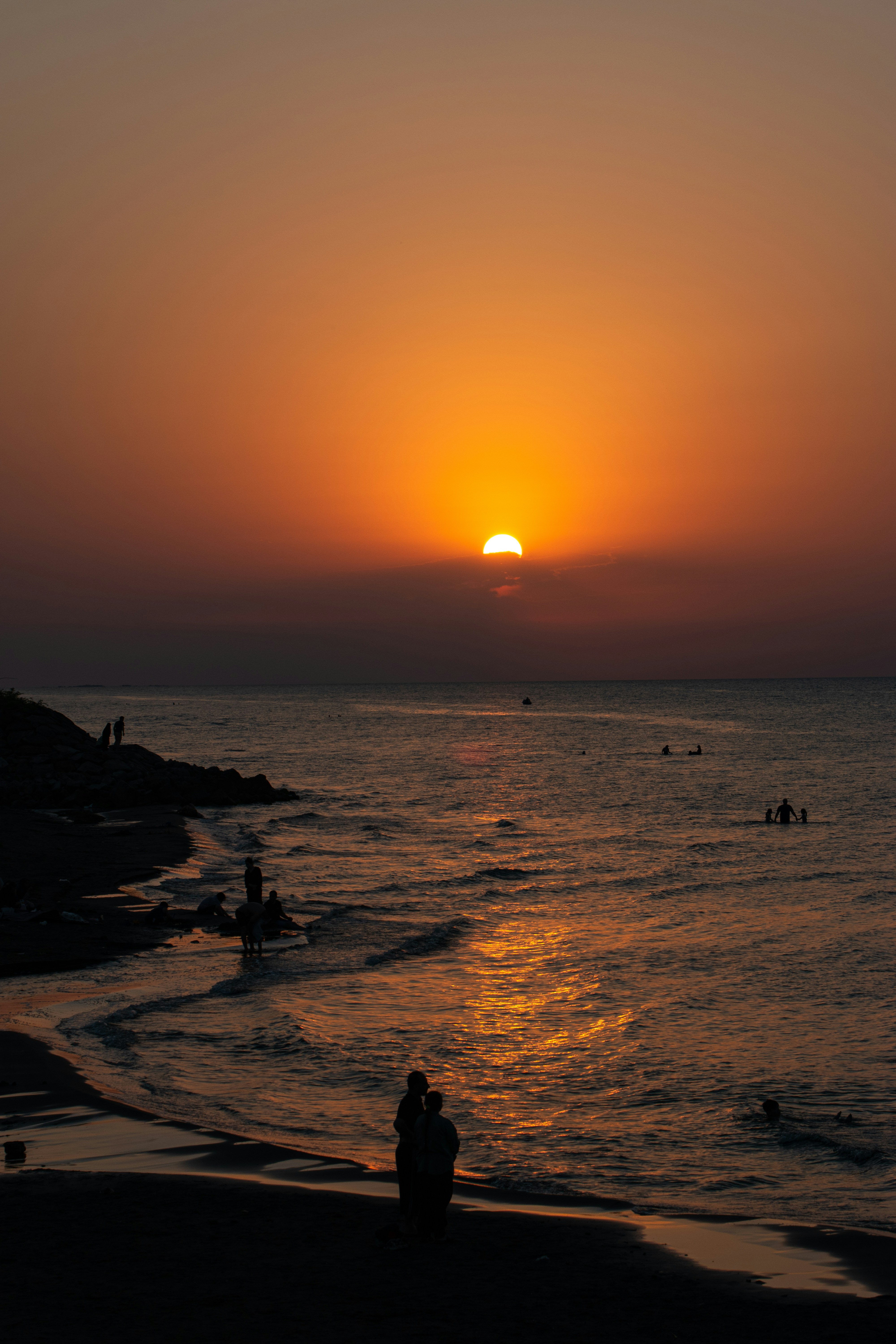 Sunset Embrace Along the Quiet Shore