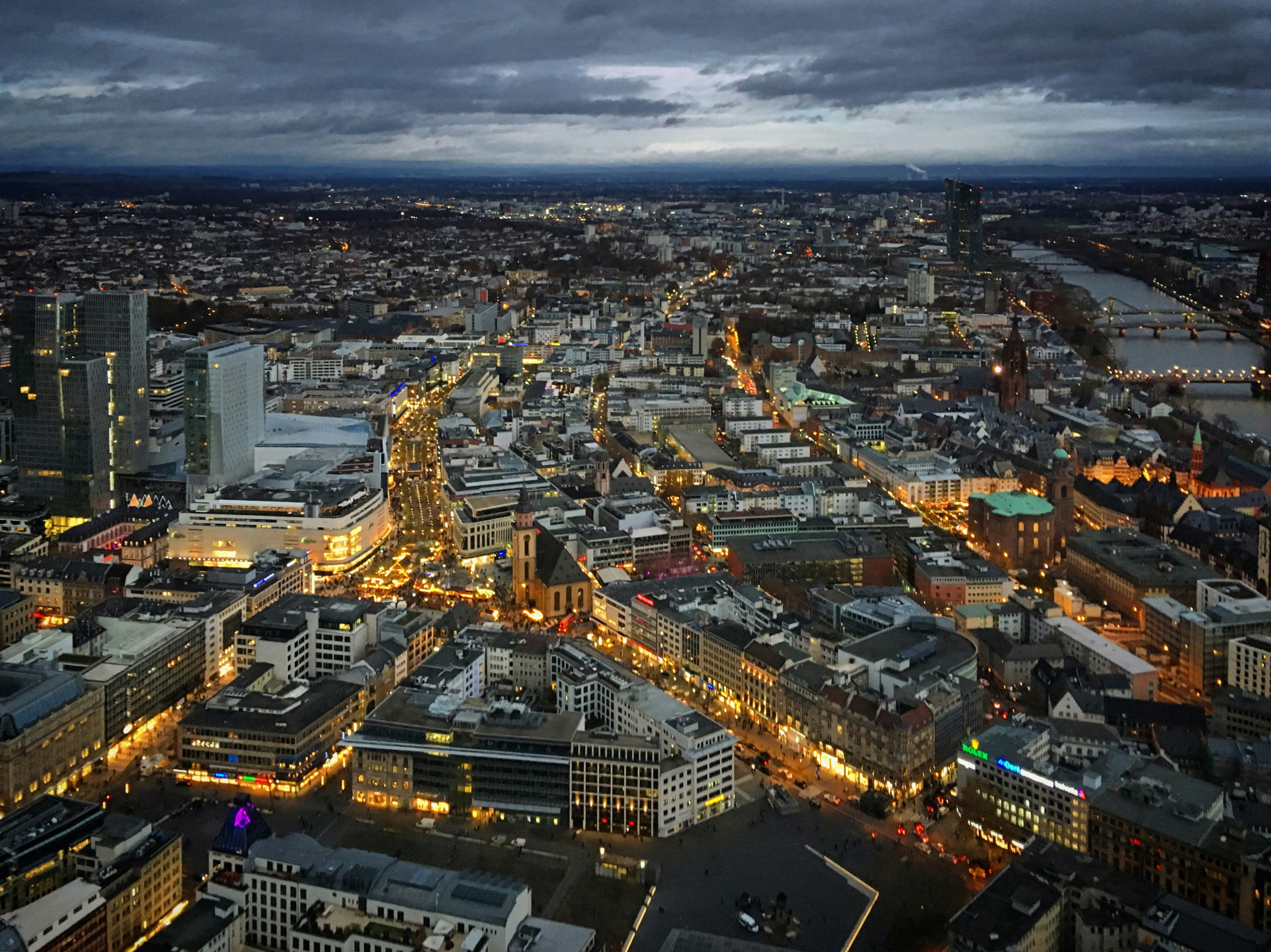 Twin Rivers at Dusk: City Grid Lights across the Sprawling Skyline