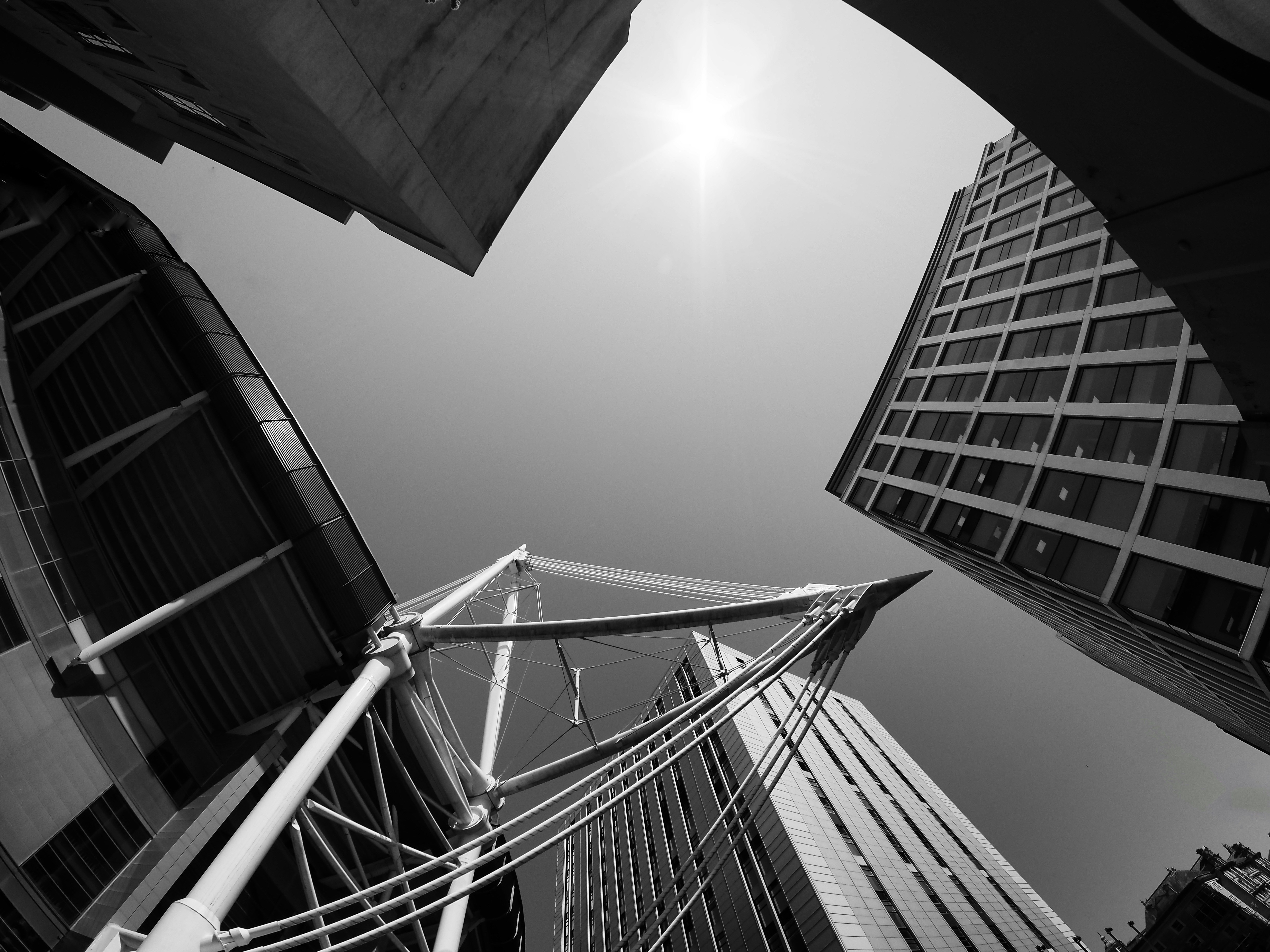 Skyward Geometry: Urban Towers Converge Toward the Sun