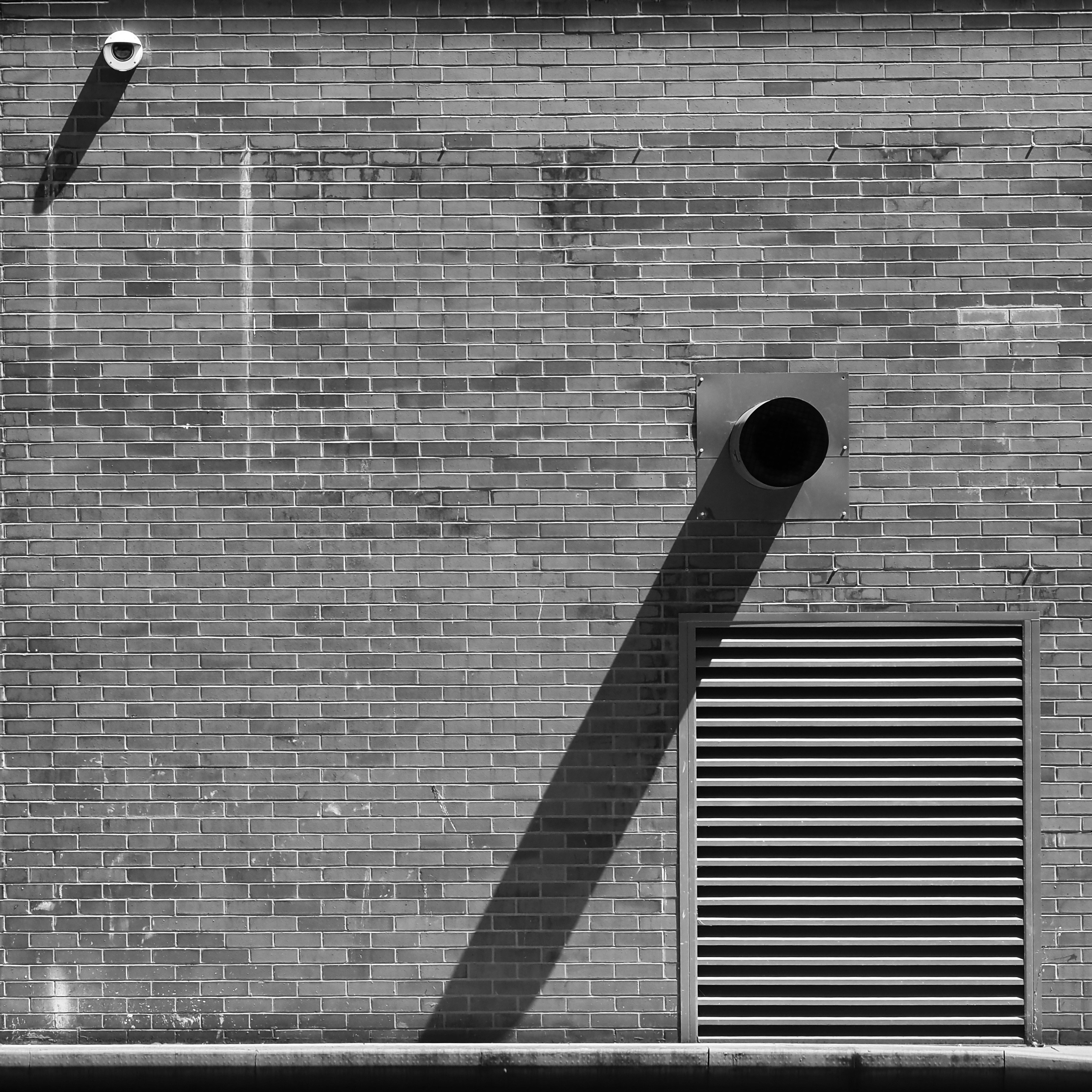 Shadow Crossing on a Brick Wall