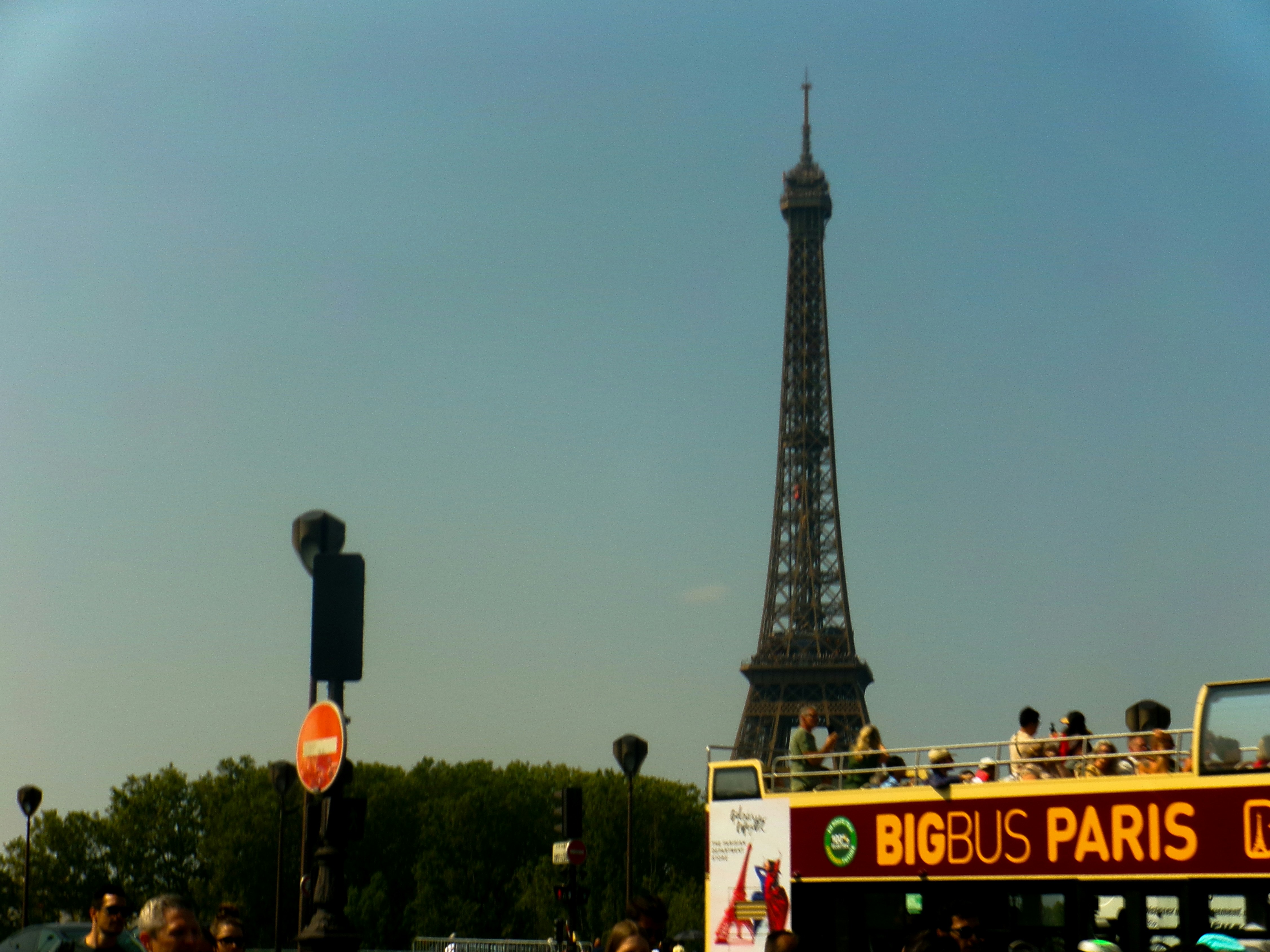 Parisian Buses Beneath the Tower