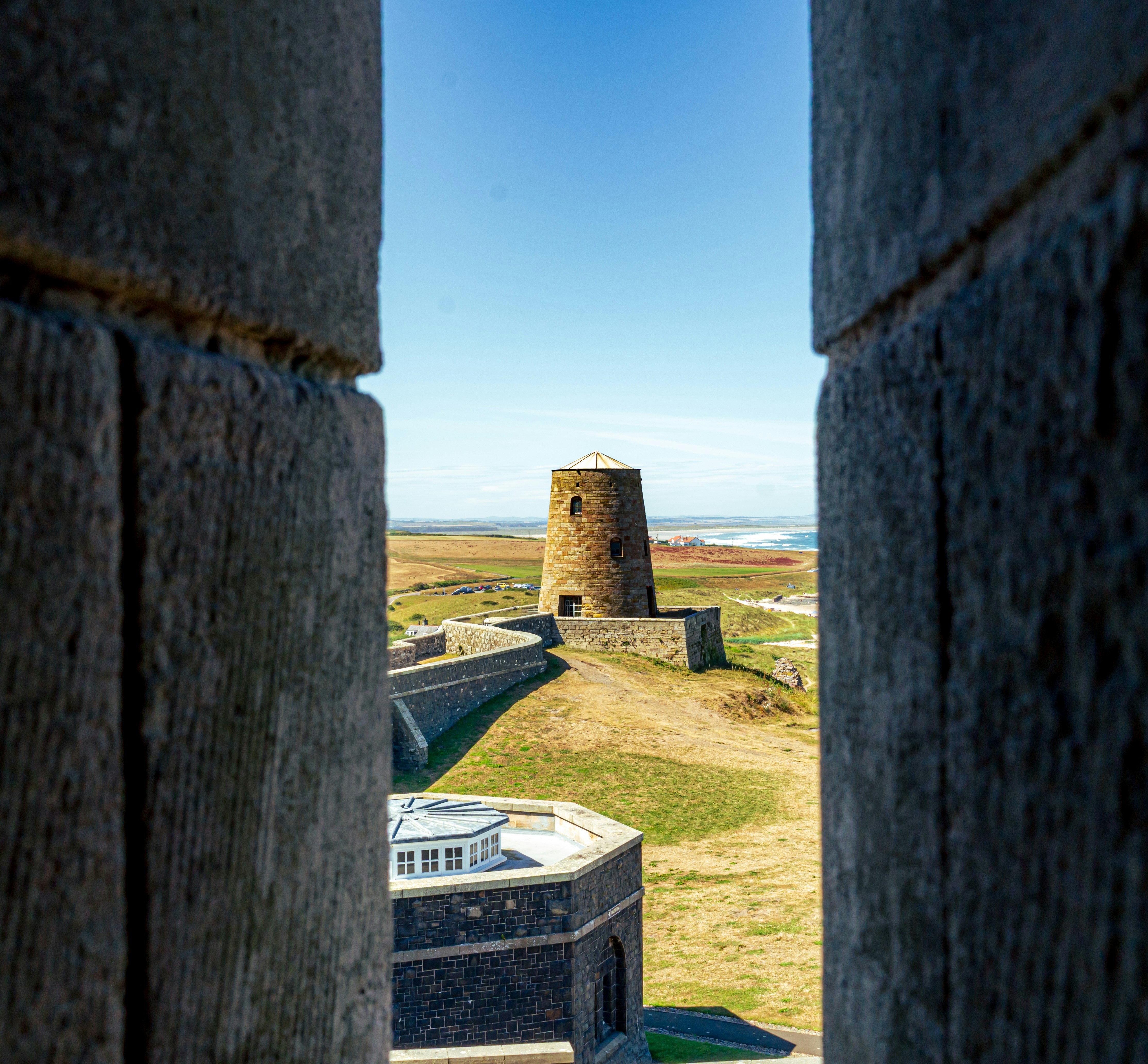 Gateway to the Seaside Keep: A View Through the Battlements