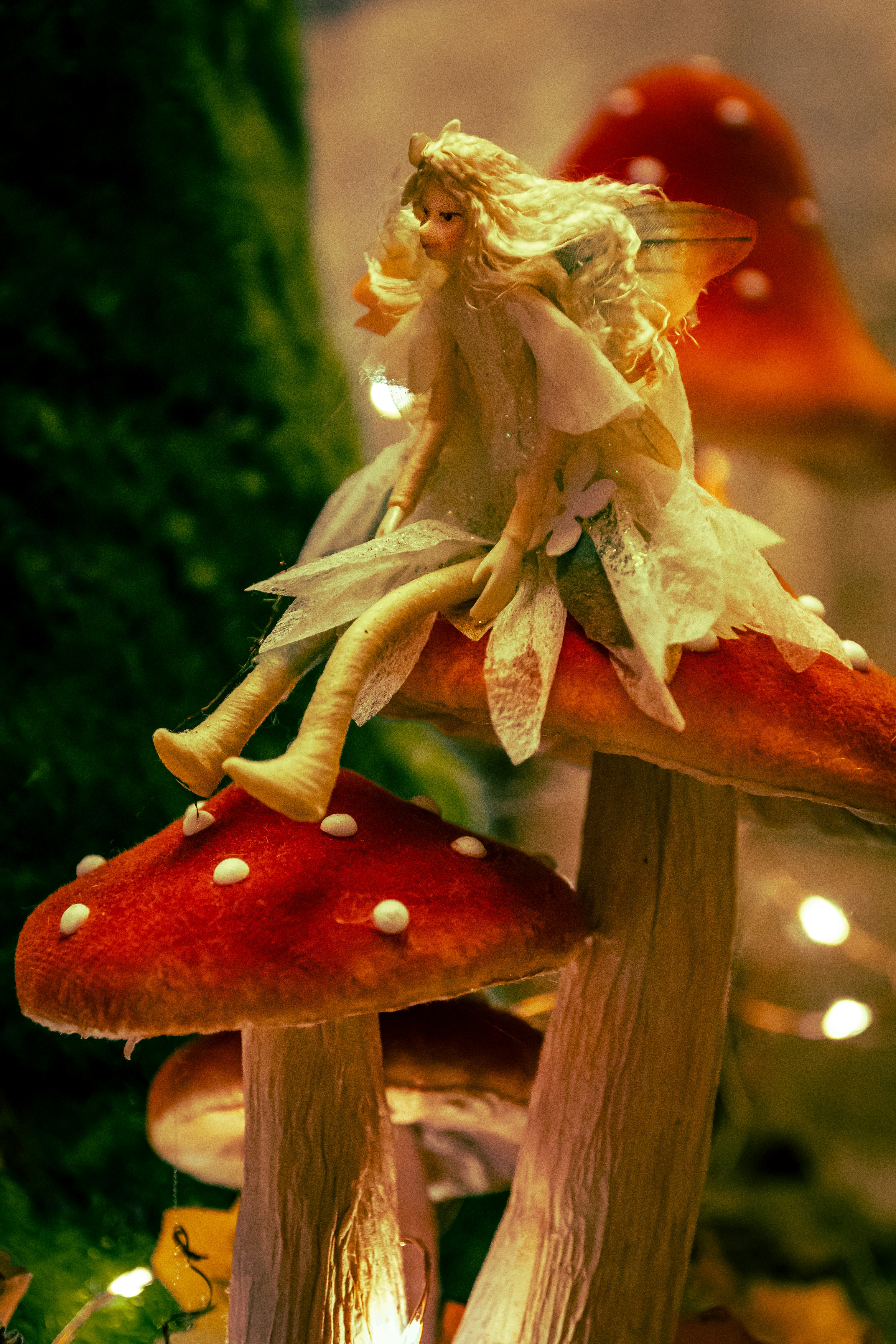 Fairy on a Mushroom: Tiny Traveler Amid Glowing Fungi