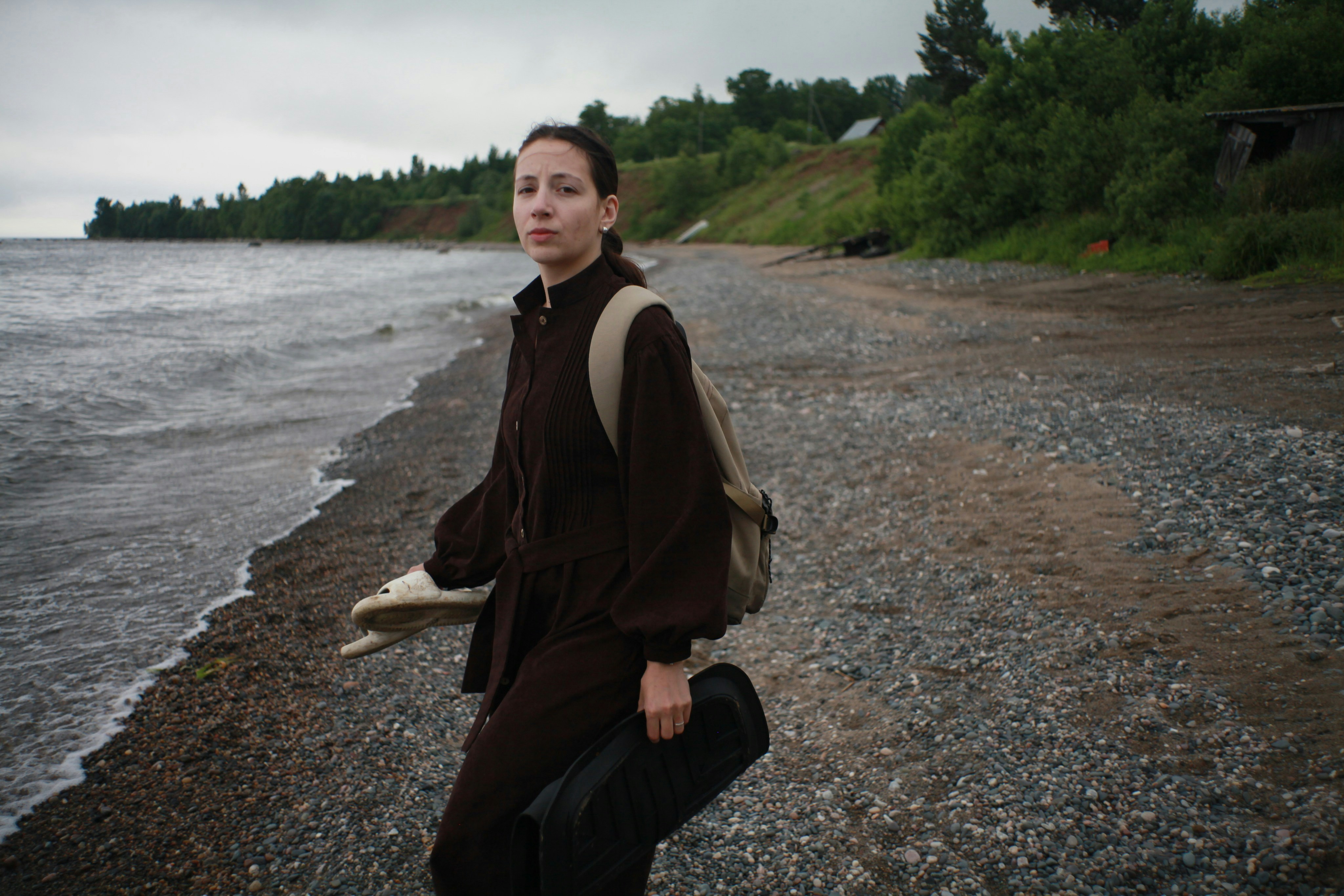 Coastal Portrait: A Quiet Moment on a Pebble Beach