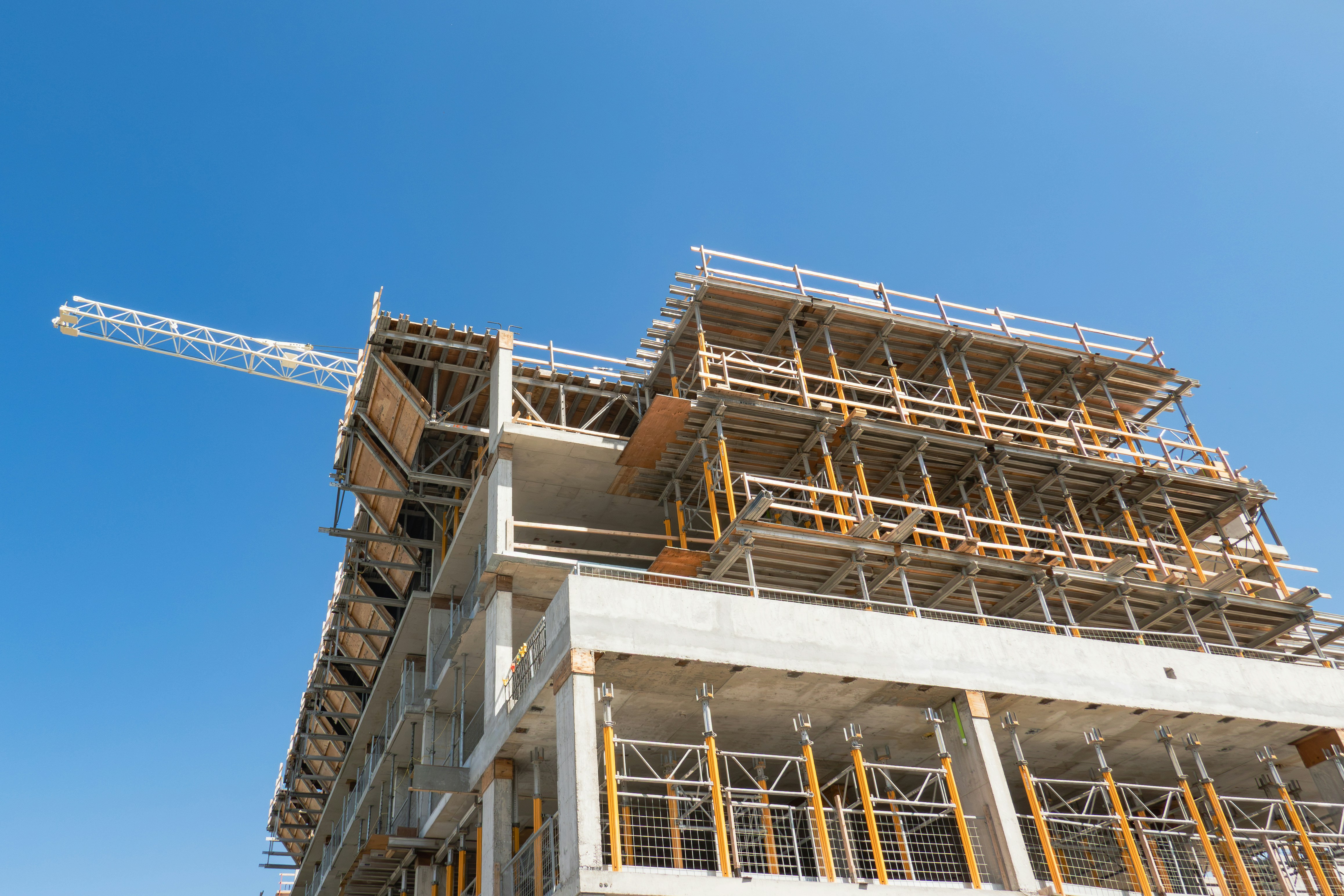 Towering Skeleton: Construction of a Modern Highrise Under a Clear Sky