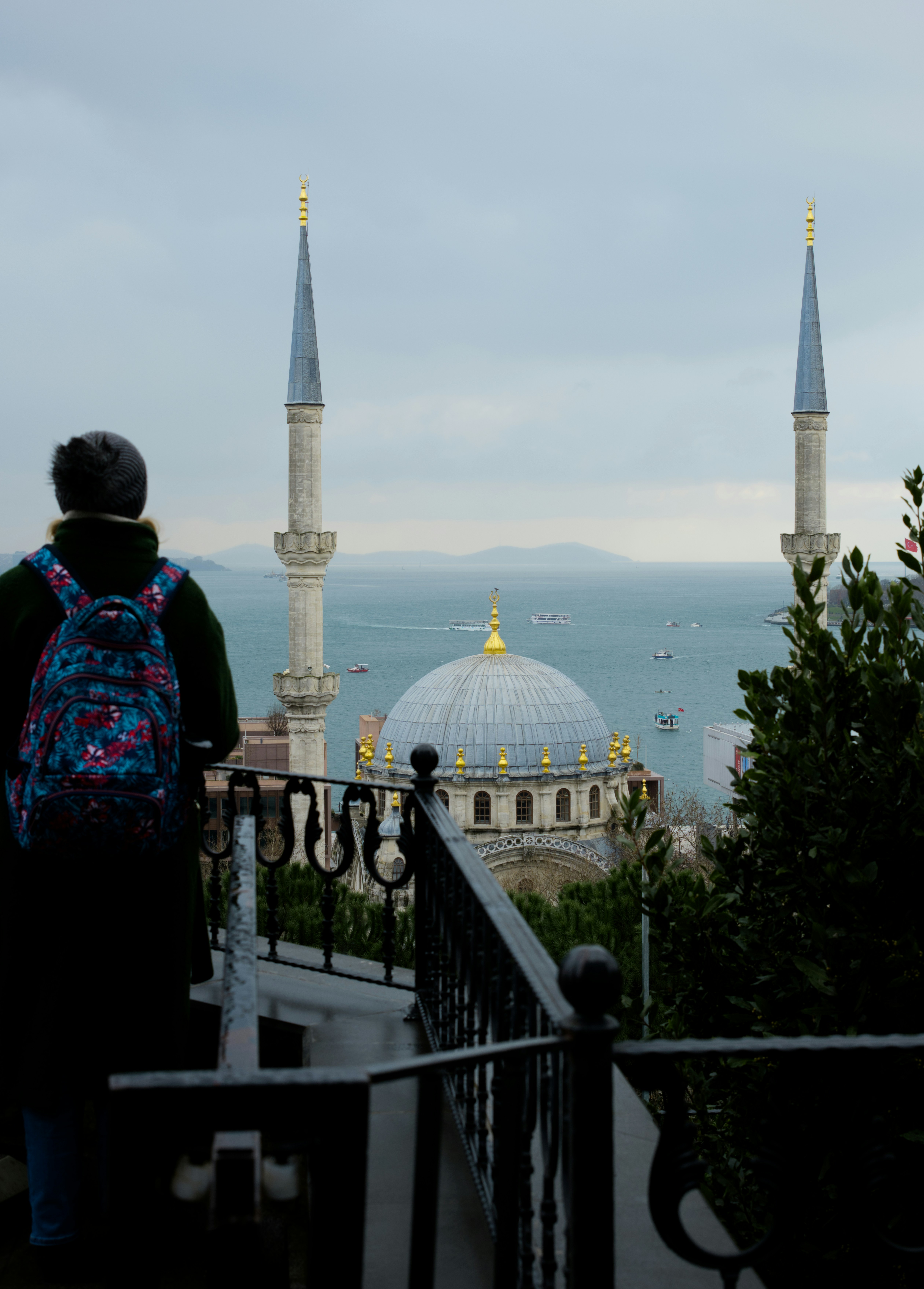 Overlooked Vantage: A Traveler's Gaze Toward the Dome and Sea