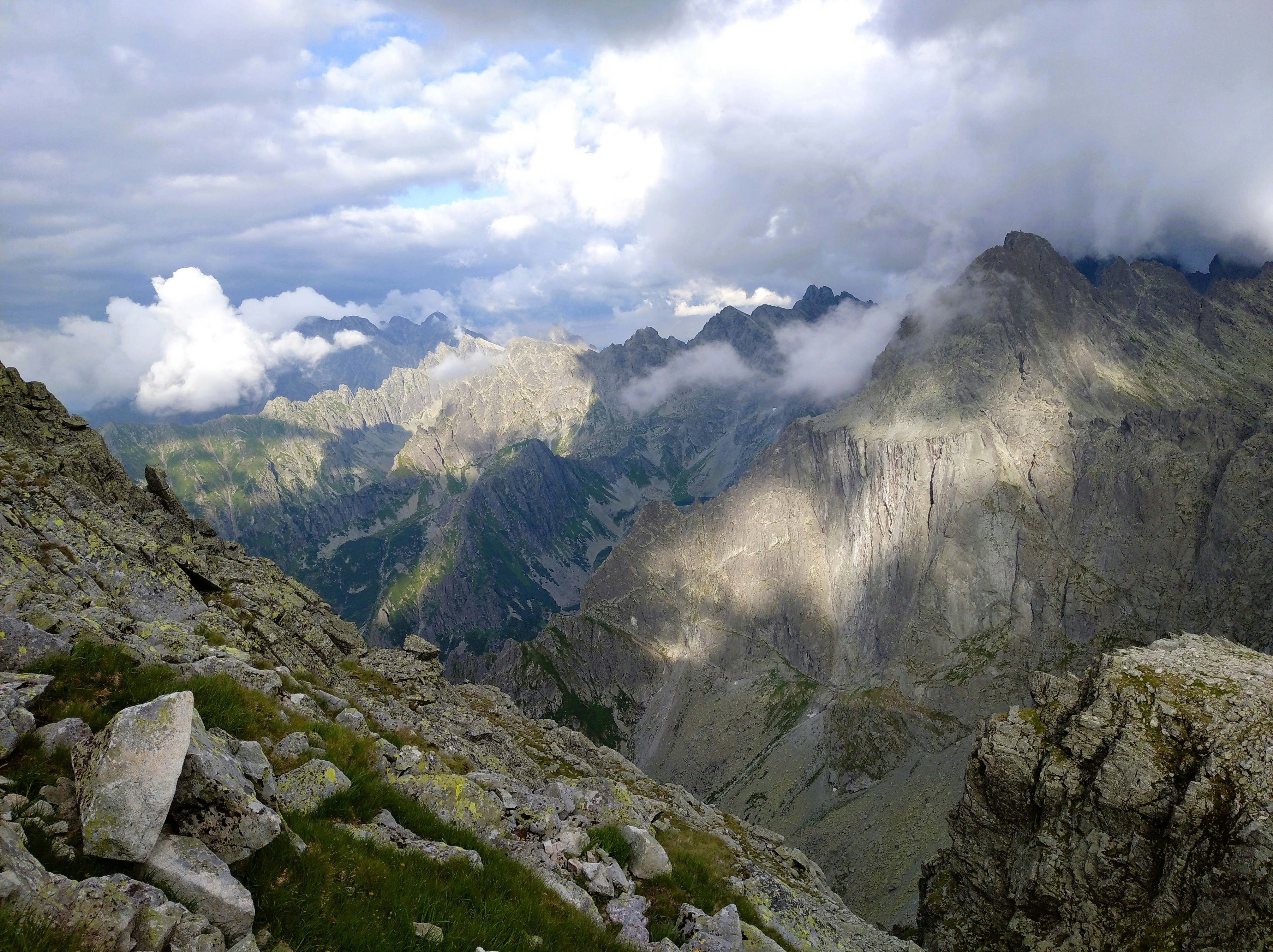 Edge of the World: Sunlit Ridge Over a Vast Alpine Gorge