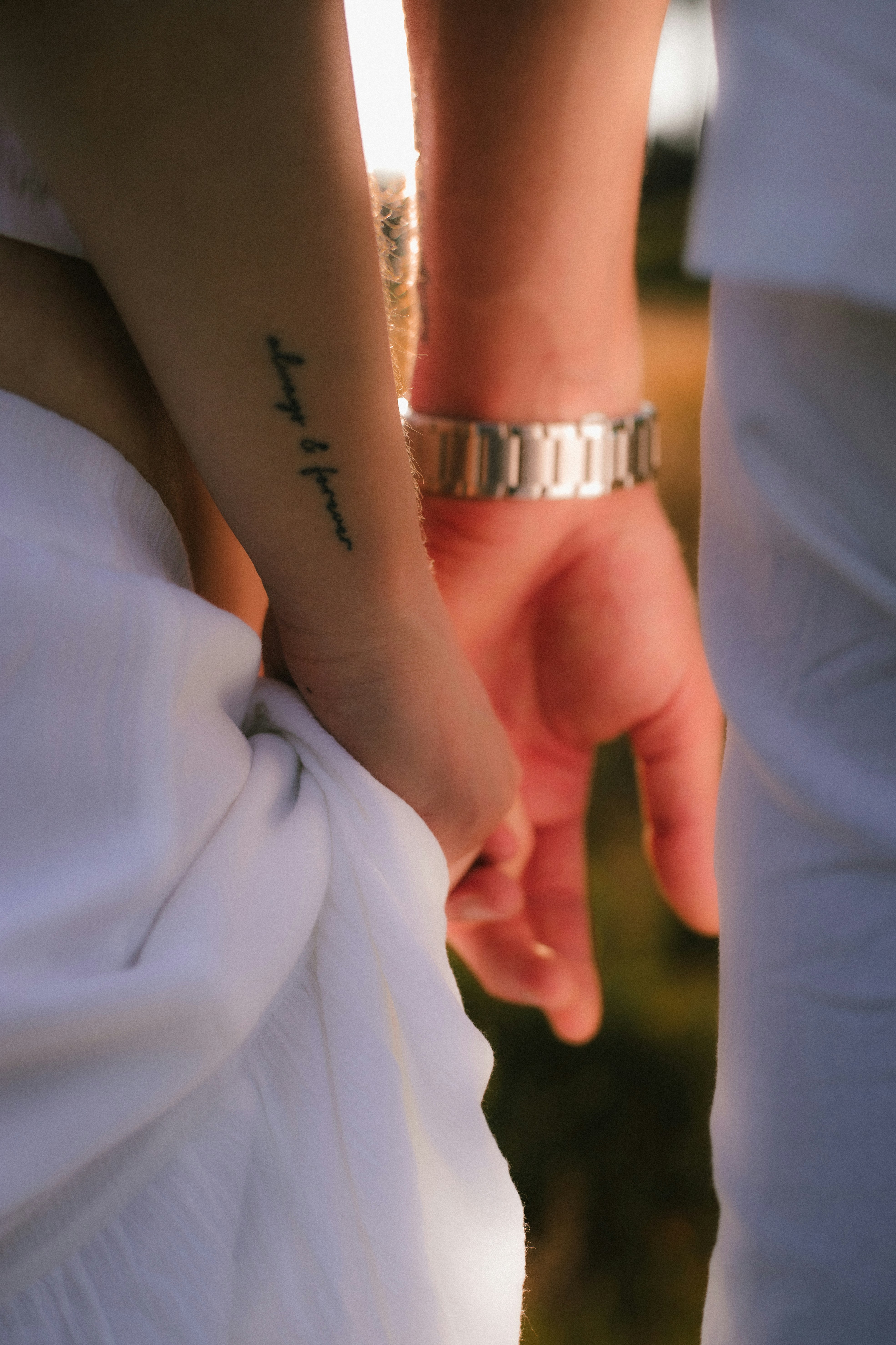 Holding On: a quiet embrace of hands and fabric